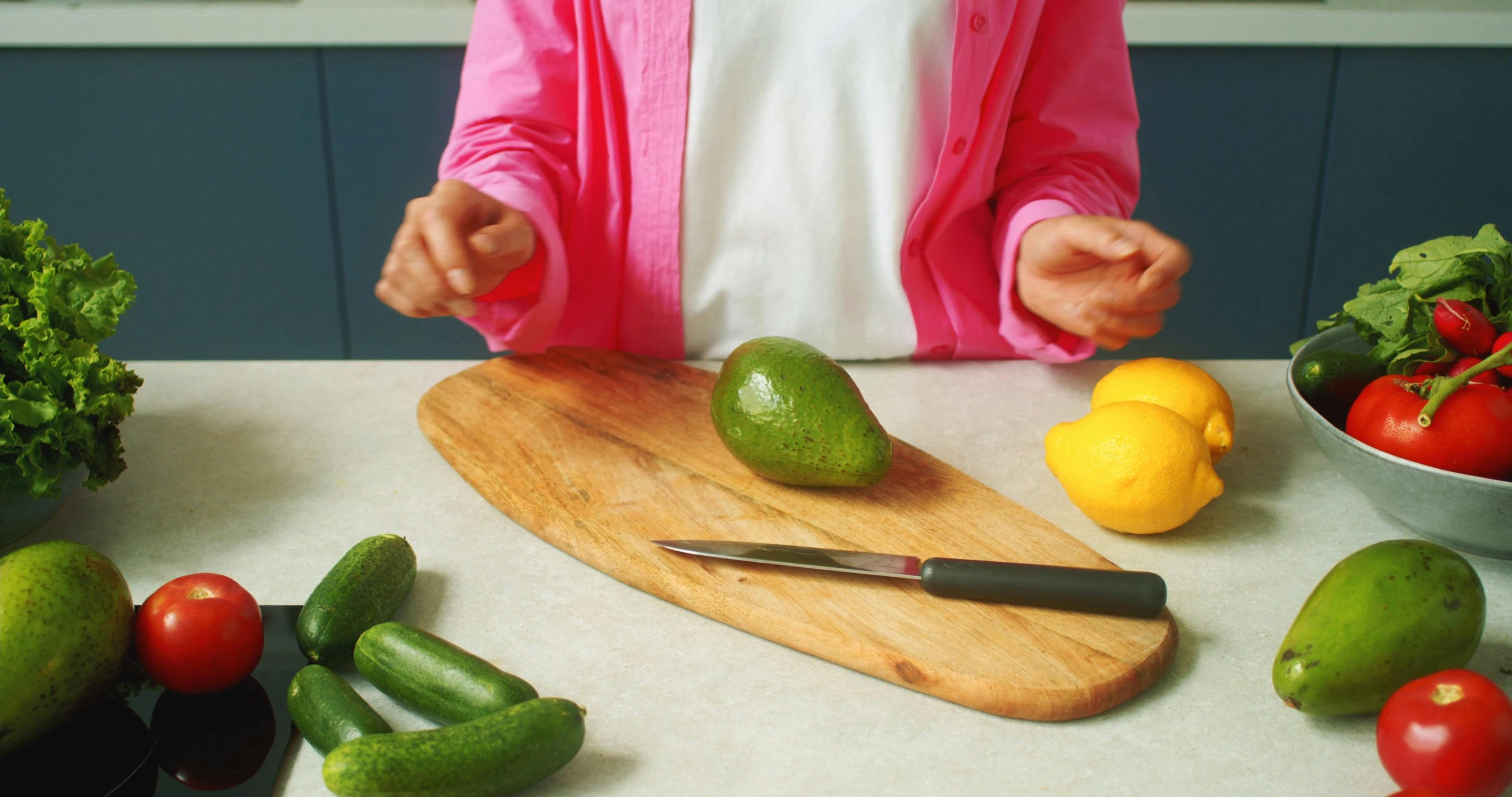 A Chef Splitting an Avocado Free Stock Video Footage, Royalty-Free 4K ...