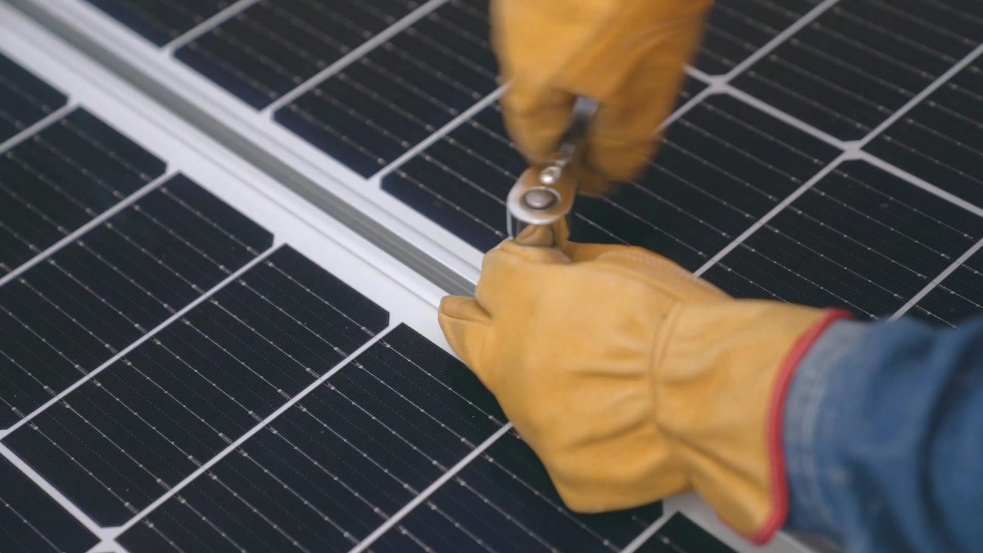 Man Mounting A Solar Panel With Socket Wrench Free Stock Video Footage ...