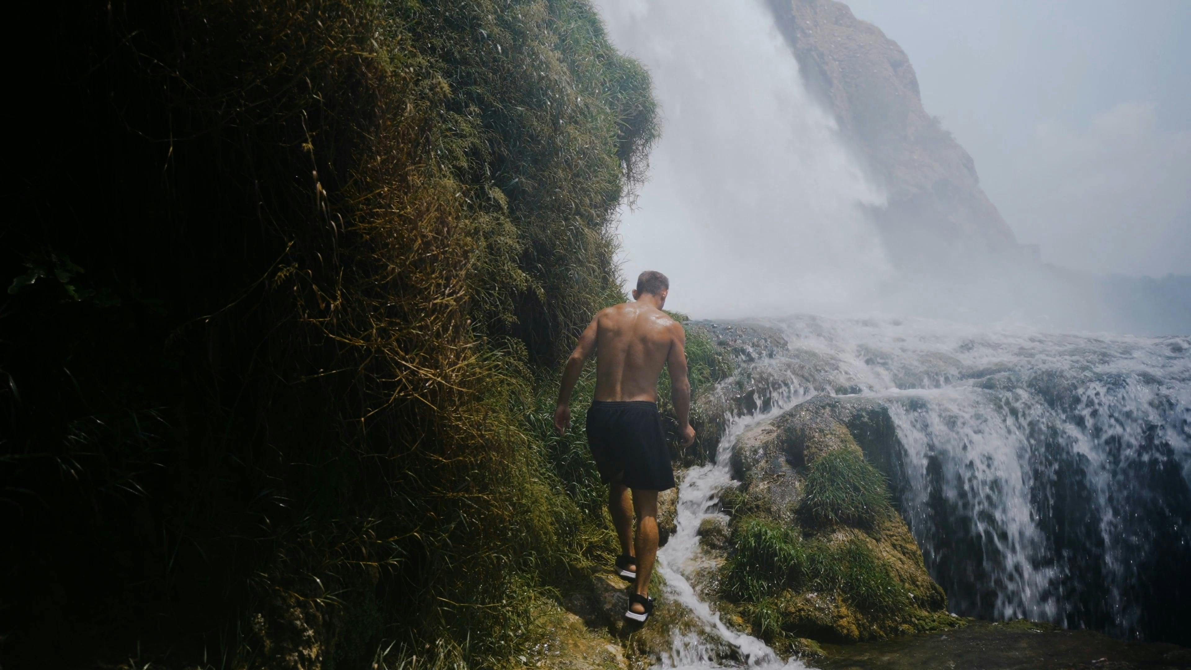 A Person Walking while Going Up on the Cliff Free Stock Video Footage ...