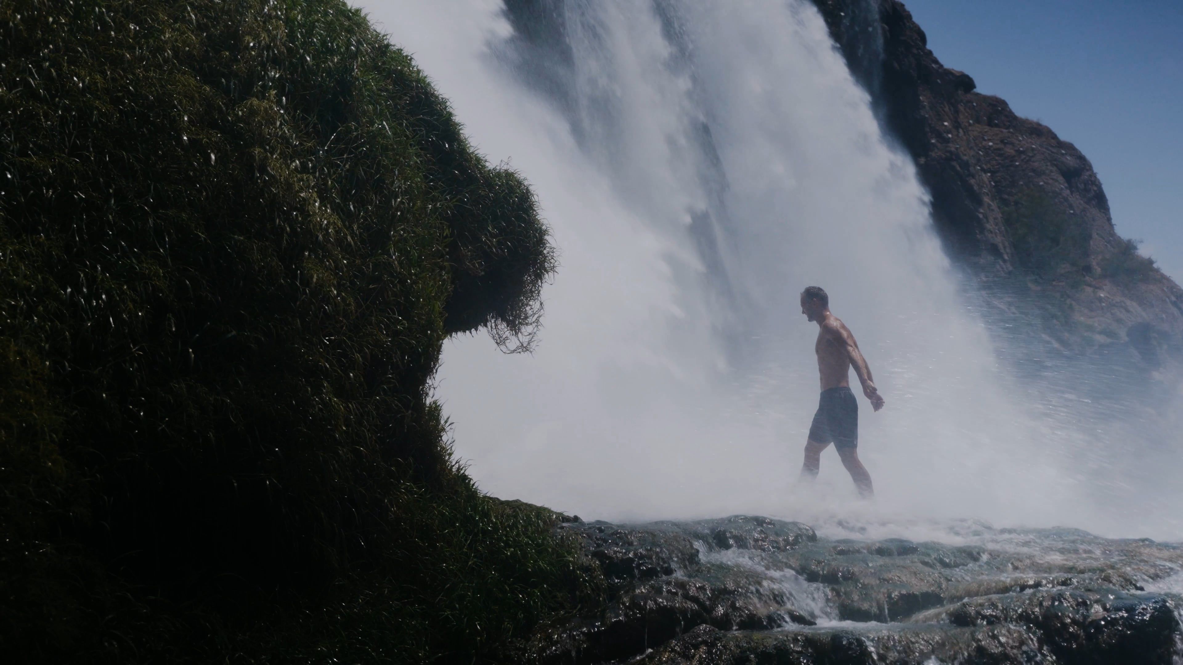 A Man Standing Beneath the Waterfalls Free Stock Video Footage, Royalty ...