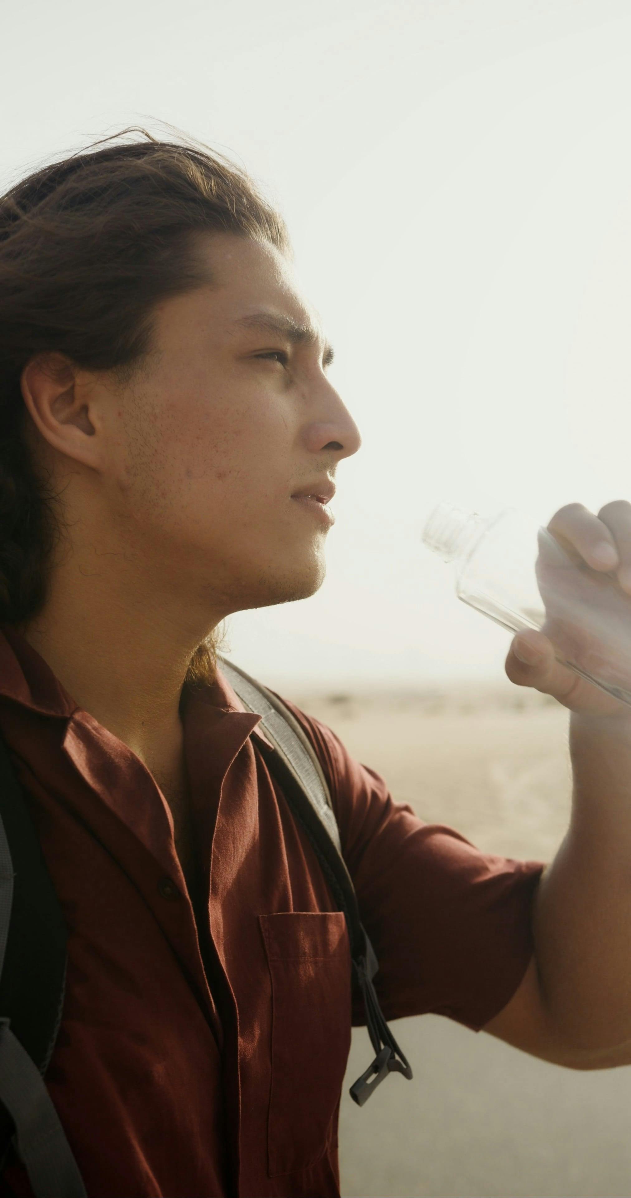 Woman Drinking Water From A Flask · Free Stock Video