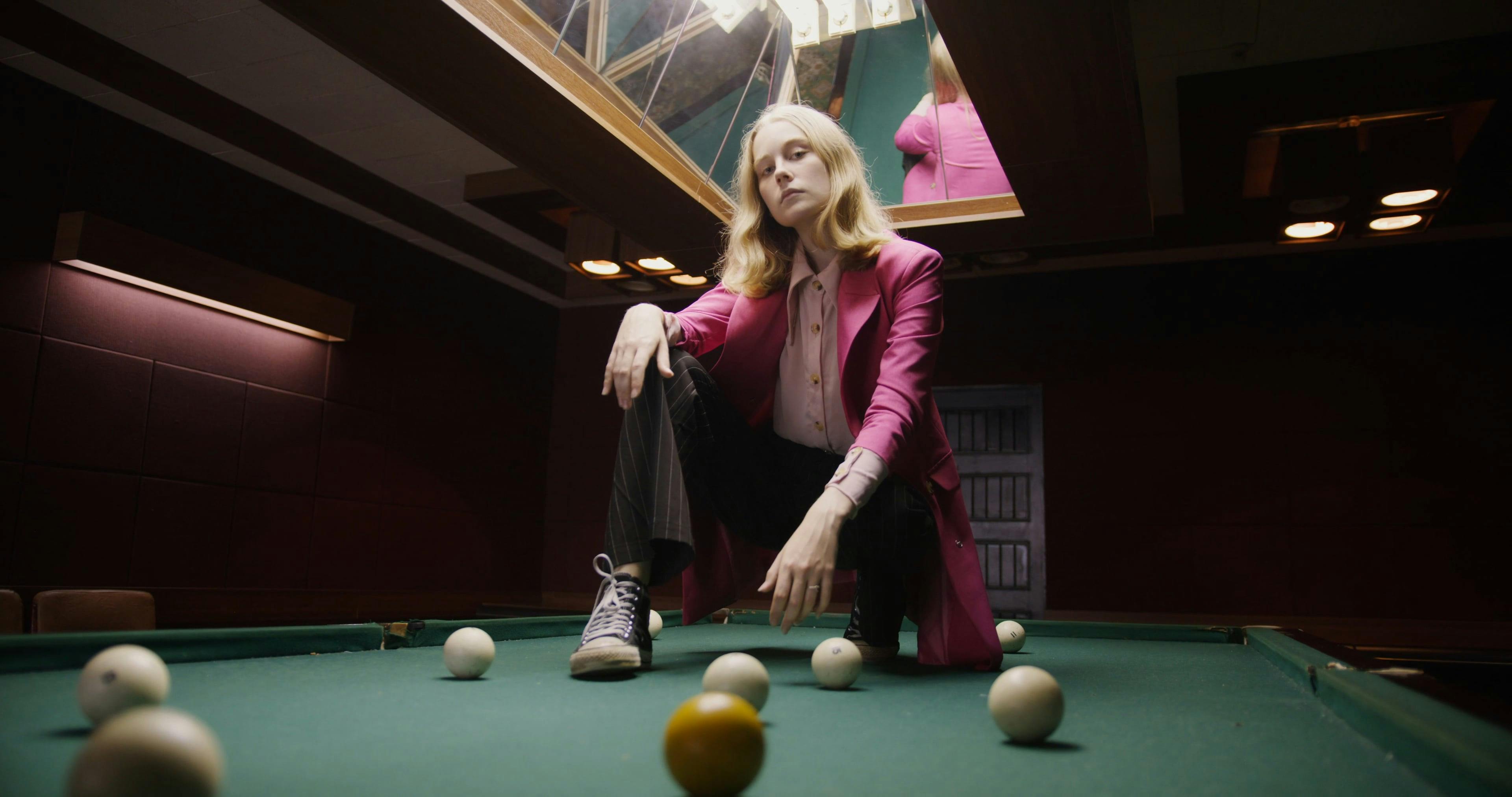 Woman Crouching on Top of a Billiard Table Free Stock Video Footage ...
