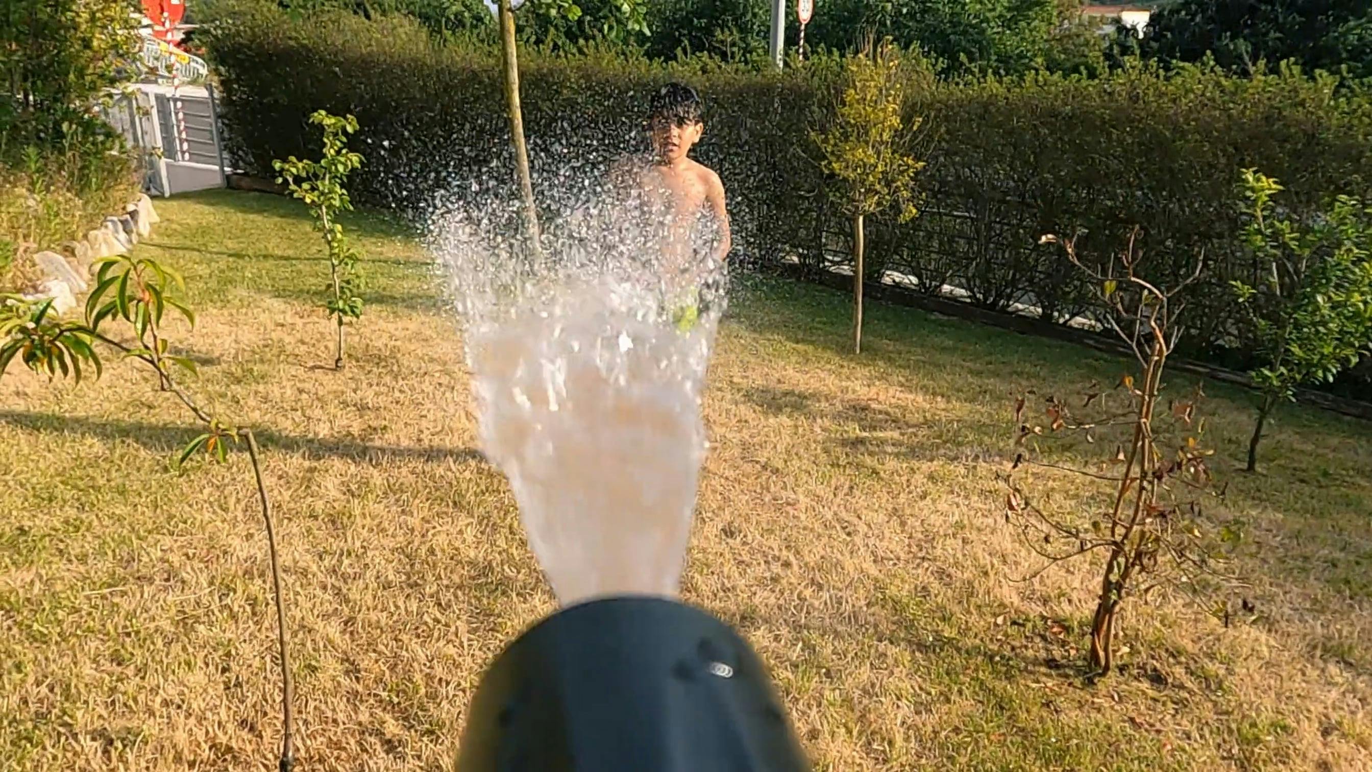 A Boy being Sprayed Water Free Stock Video Footage, Royalty-Free 4K ...