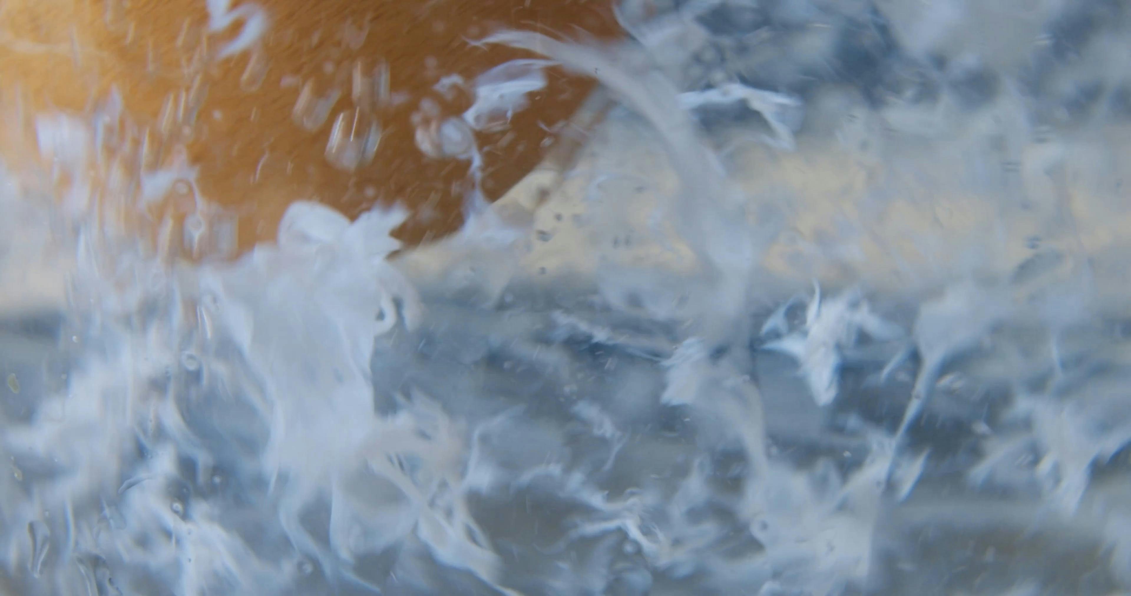 A Cracked Egg in Boiling Water · Free Stock Video