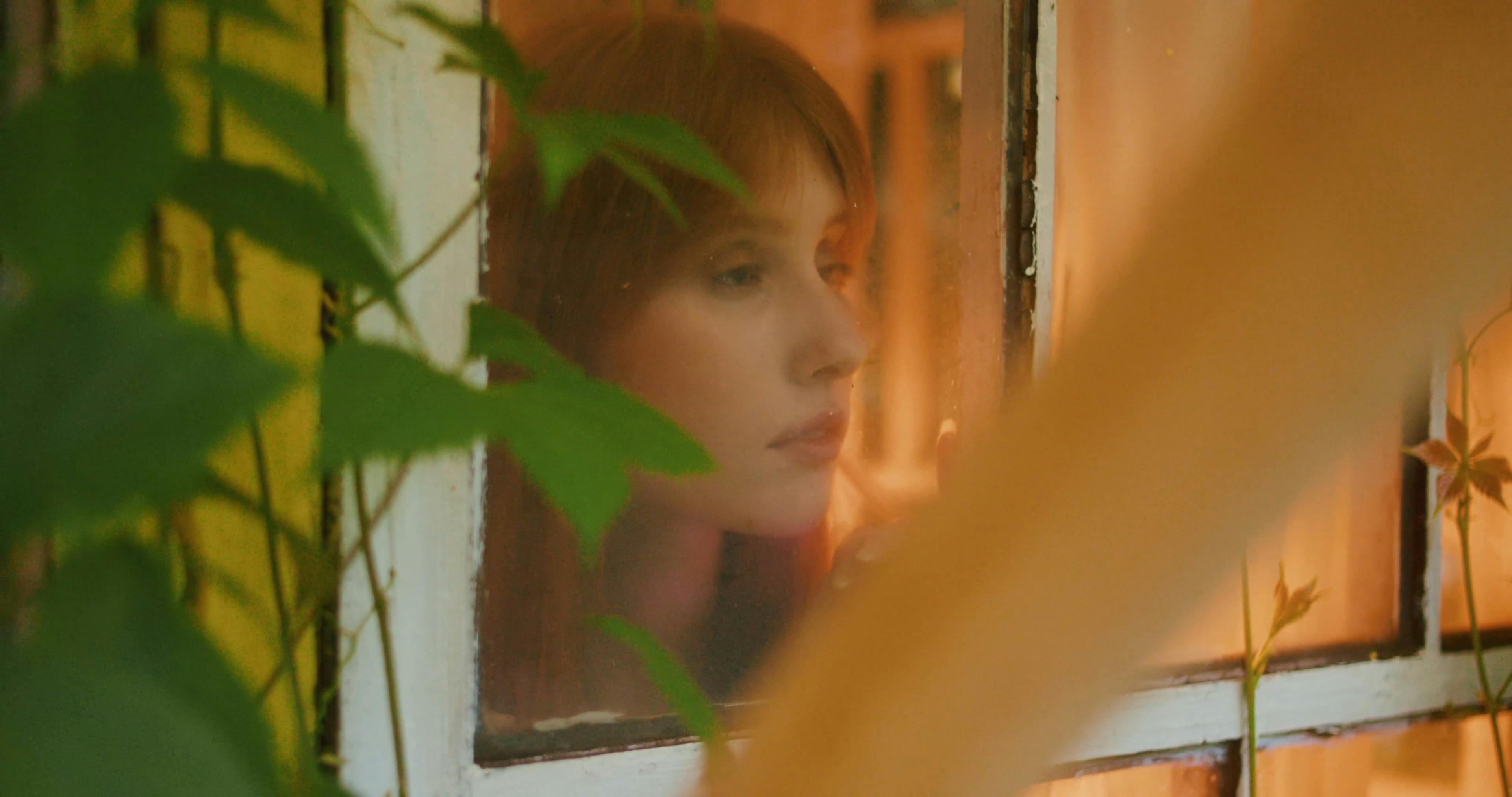 A Woman Looking Outside the Window Free Stock Video Footage, Royalty ...