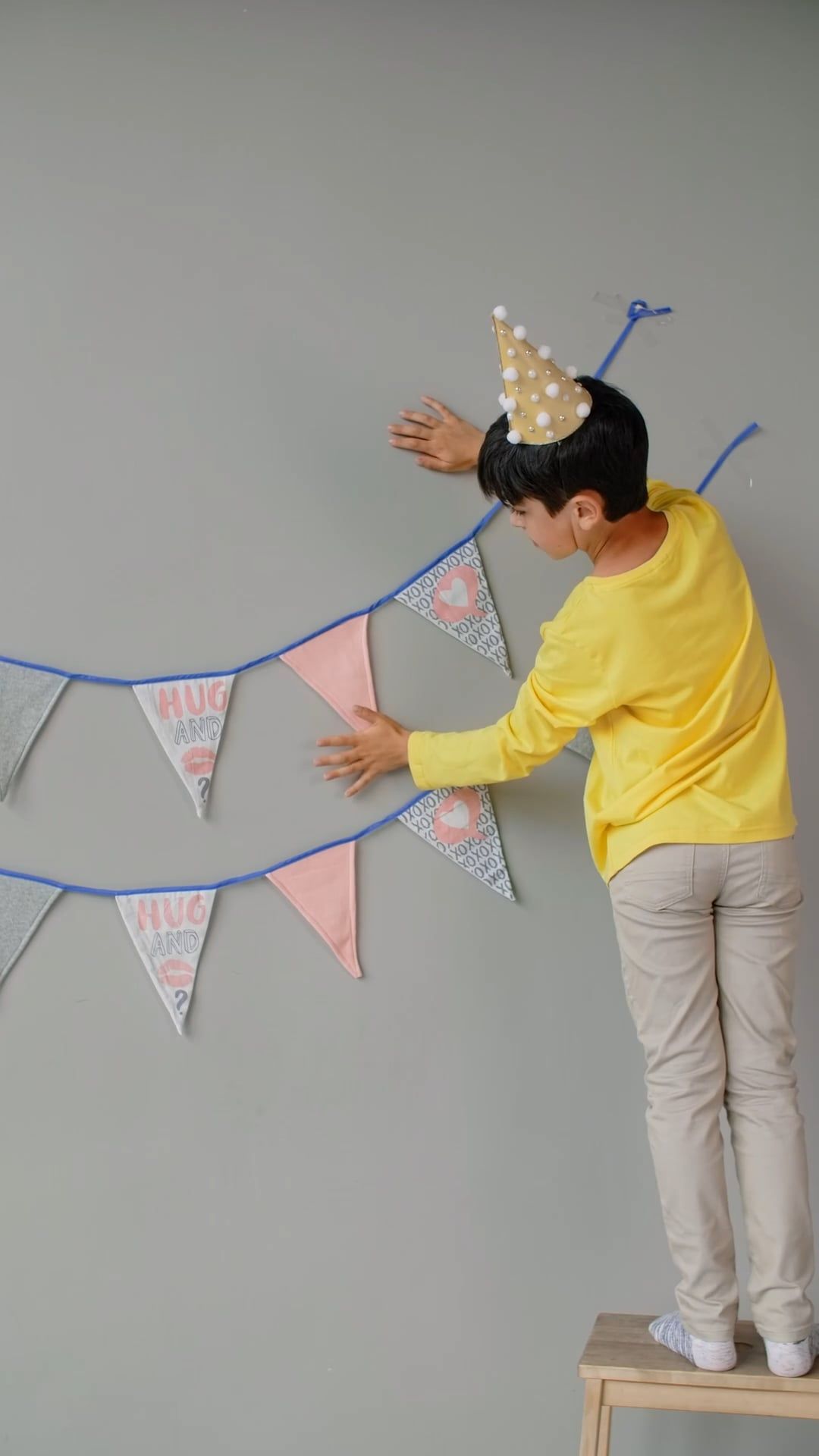A Little Boy Touching Banderitas on a Wall Free Stock Video Footage ...