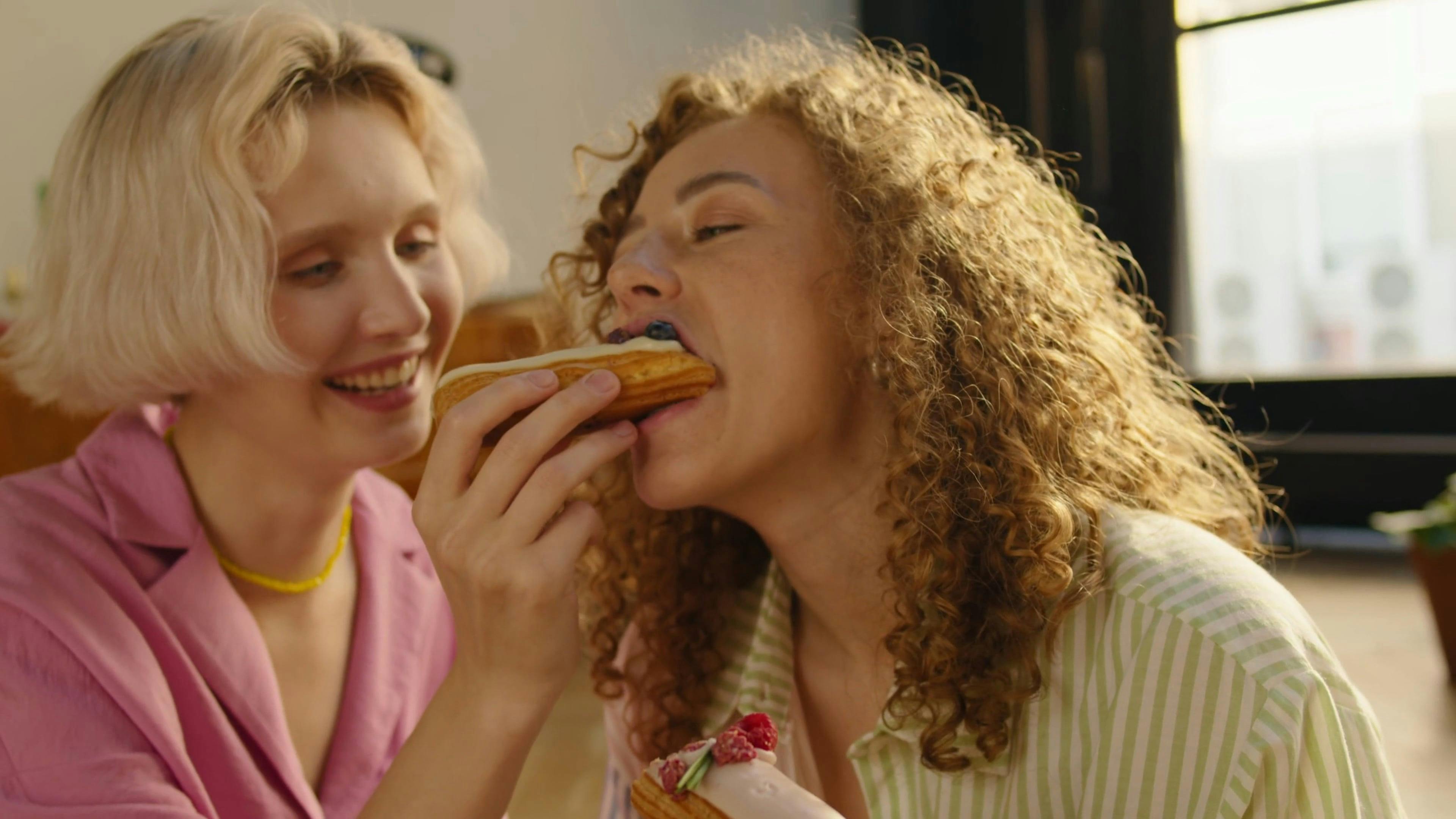 Women Eating Eclairs · Free Stock Video