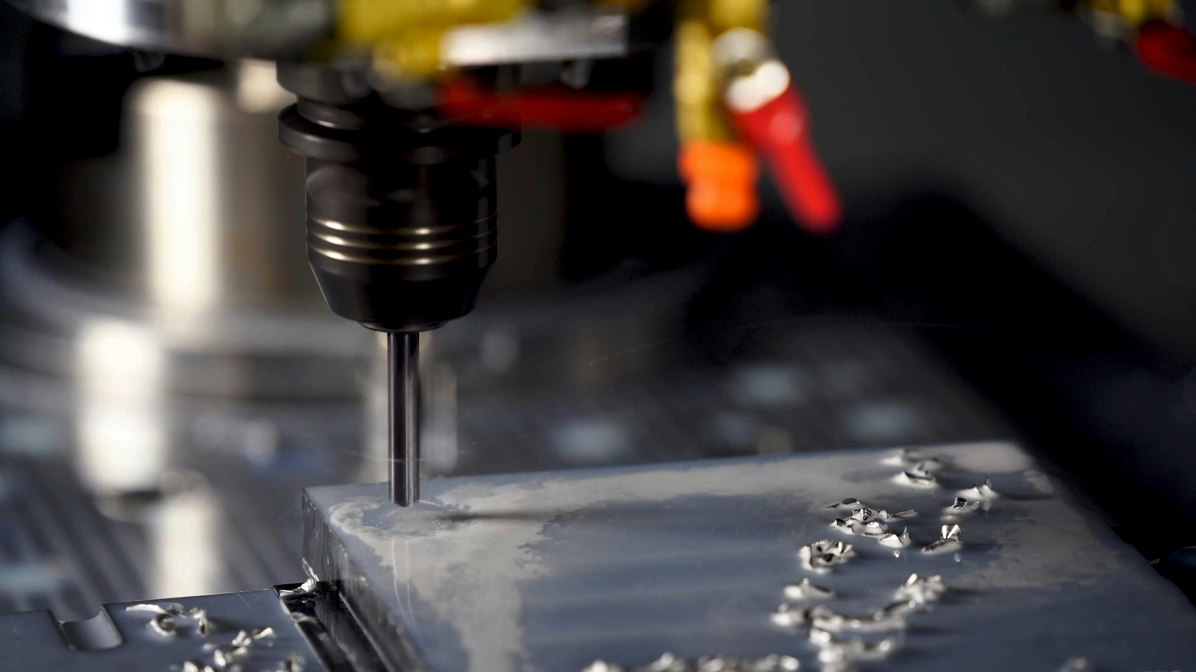 Close-up Video of a Machine Drilling Holes on Metal · Free Stock Video