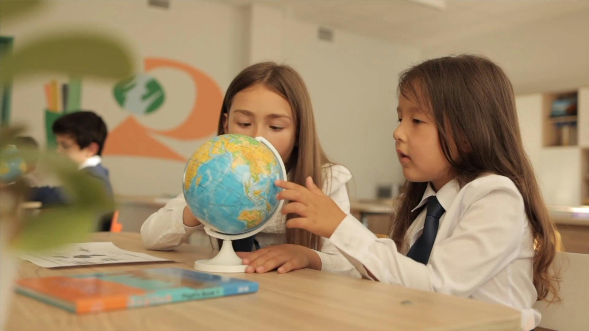 Students Studying Globe at School · Free Stock Video
