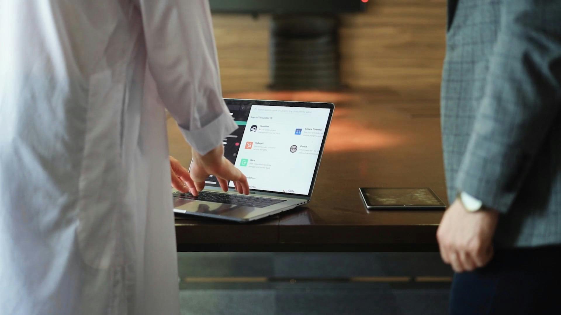 Close-up Footage of a Person Showing the Screen of a Laptop Free Stock ...