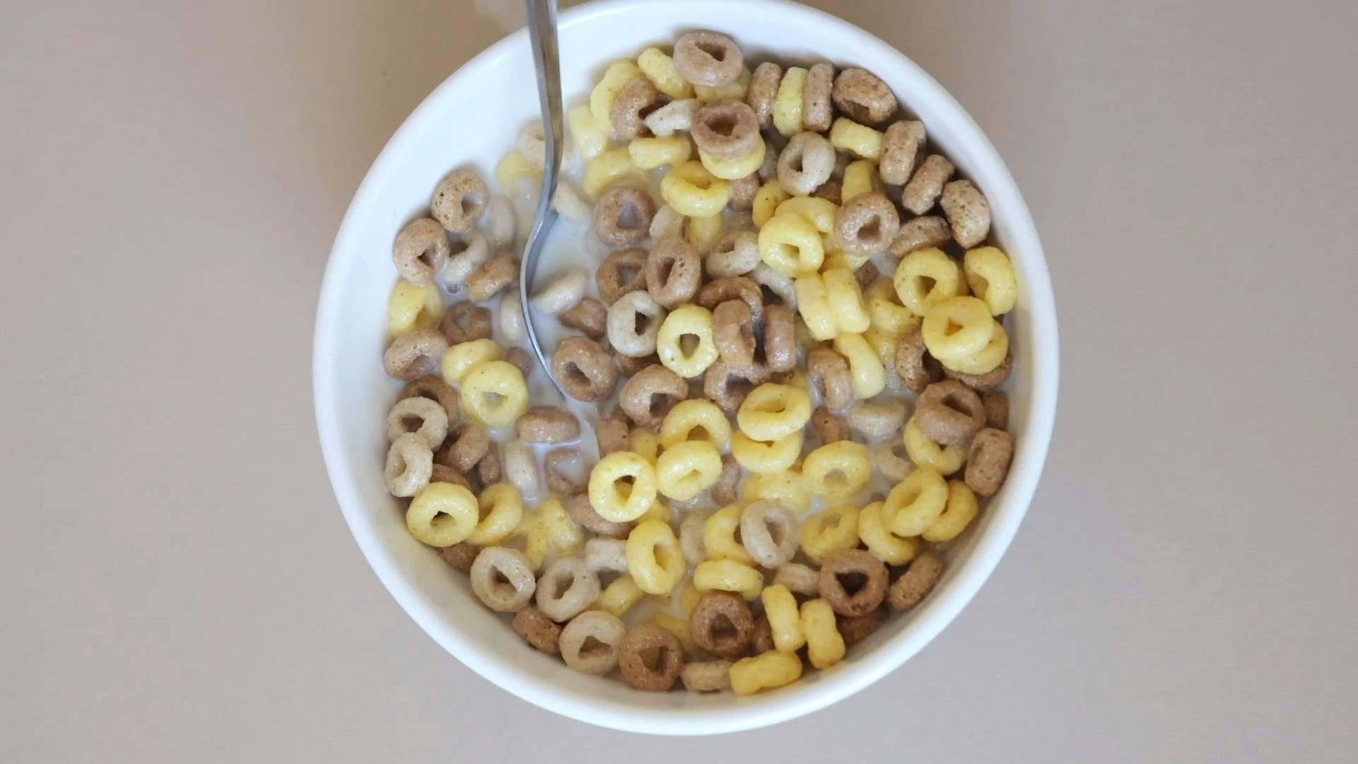 Forming Words Made Of Alphabet Cereals Flat Laying On A Bowl Of Milk ...