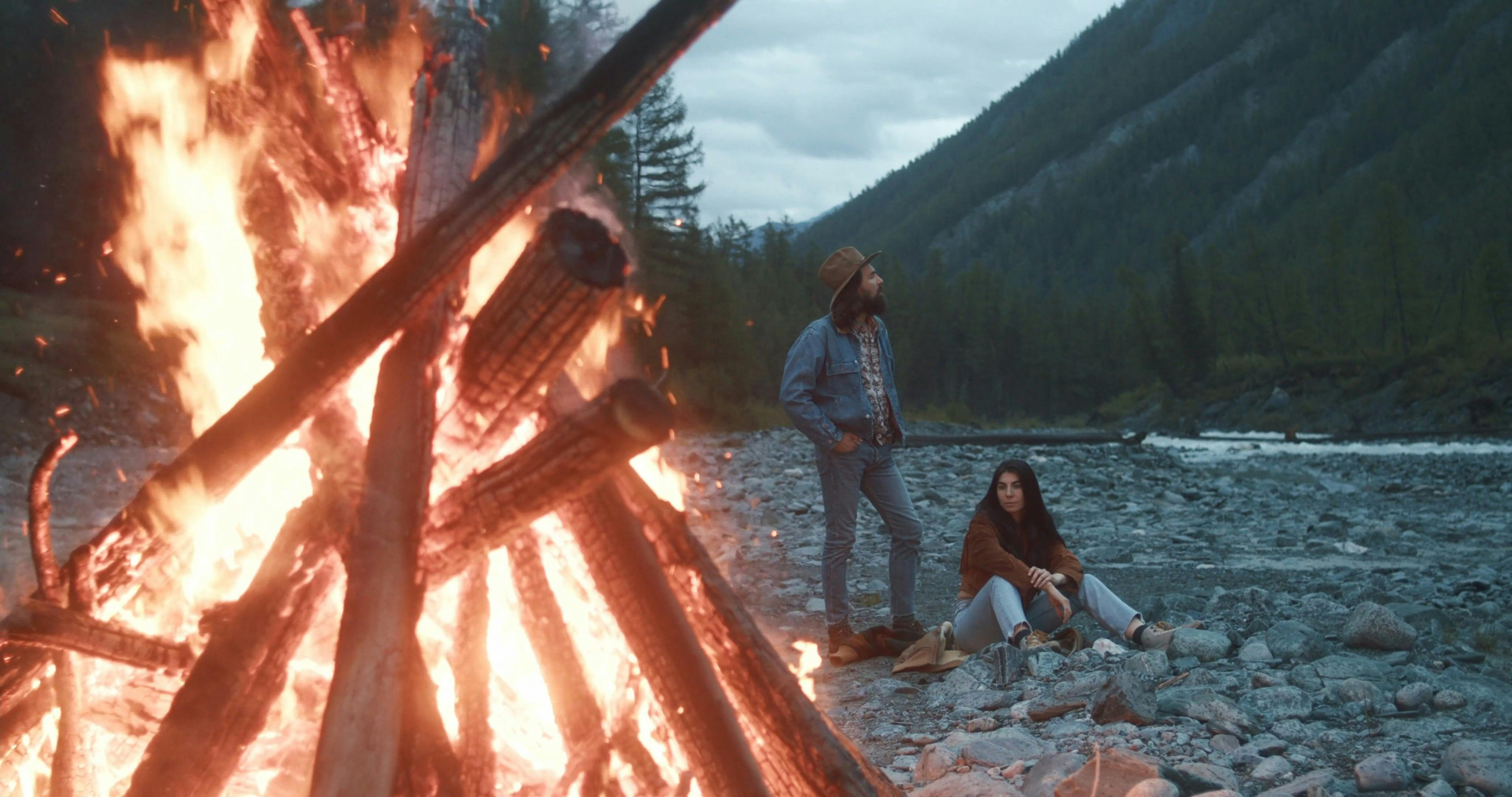 A Group Of People Gathers Around The Bonfire · Free Stock Video