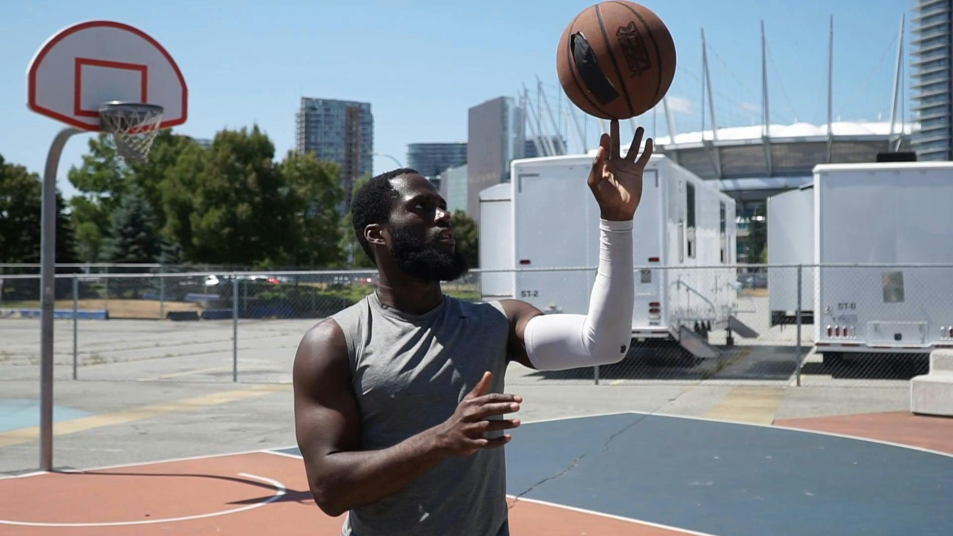 A Man Spinning the Basketball · Free Stock Video