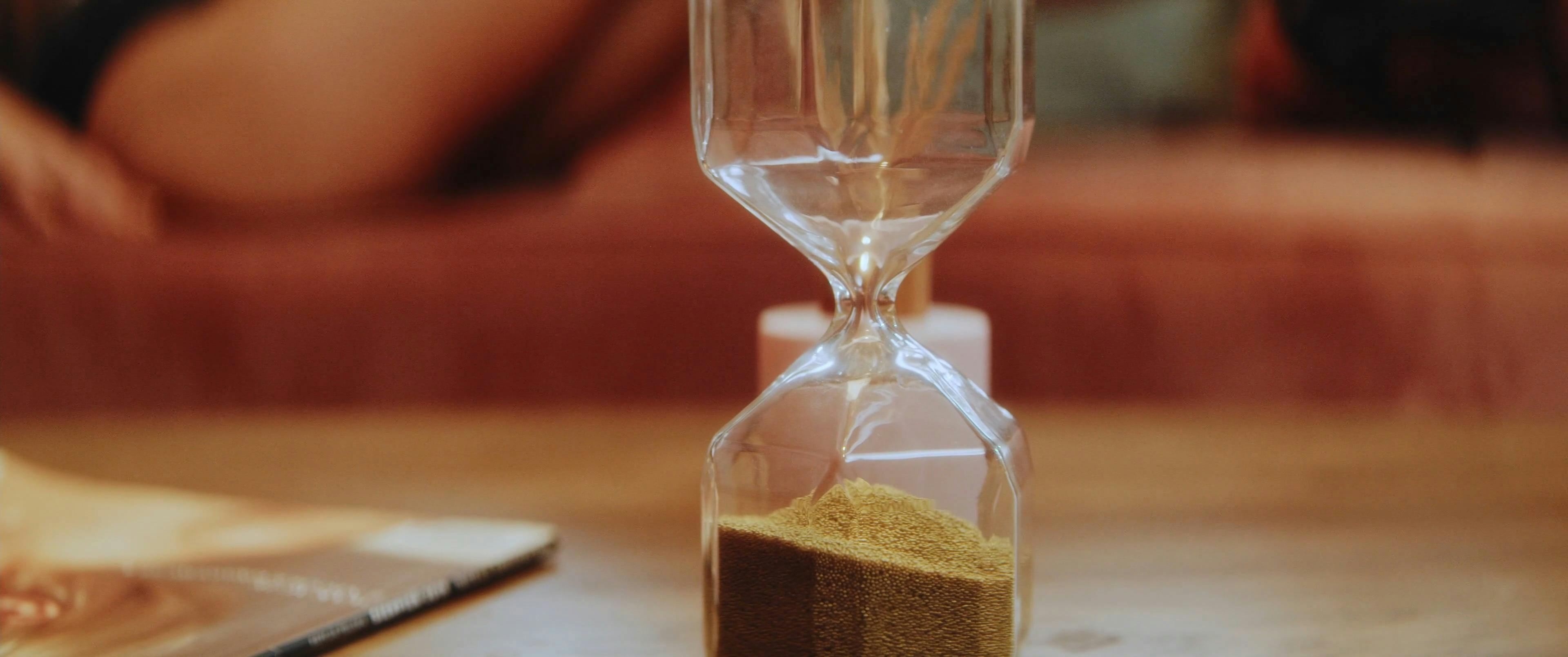 A Woman Flipping an Hour Glass Free Stock Video Footage, Royalty-Free ...