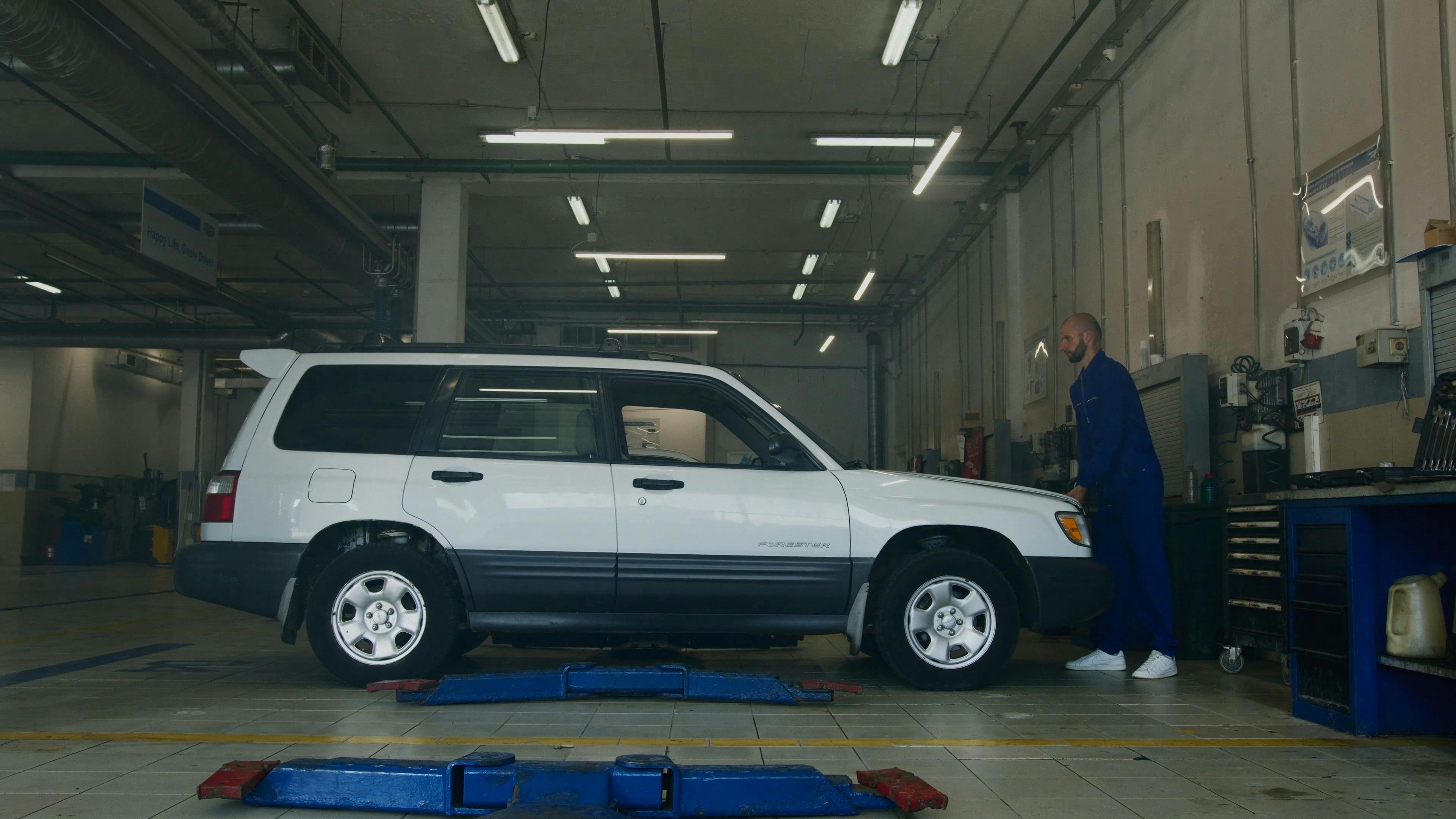 Close up of a Mechanic Disassembling a Greasy Car Part Free Stock Video ...