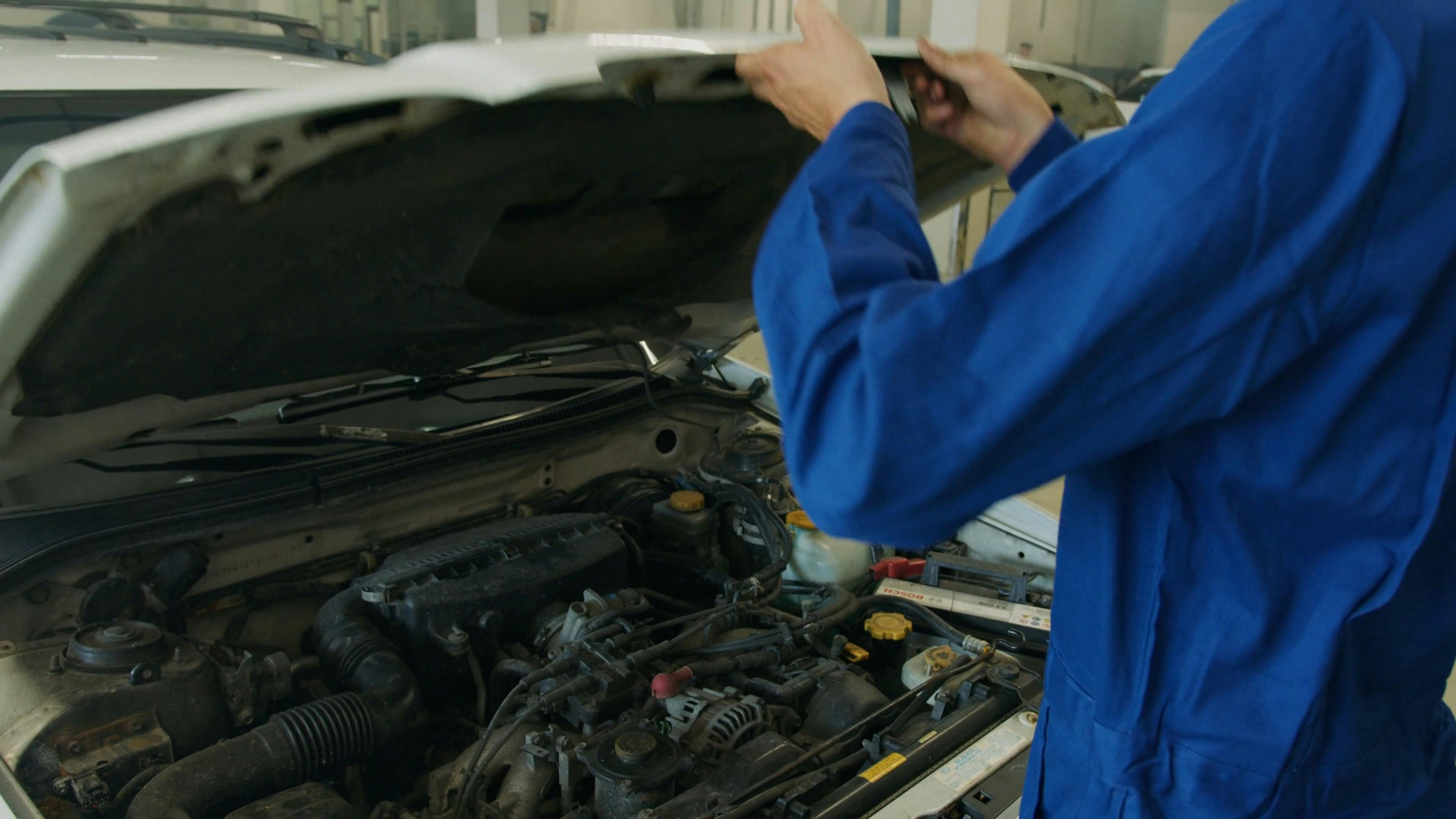 A Person Checking the Engine of the Car Free Stock Video Footage ...
