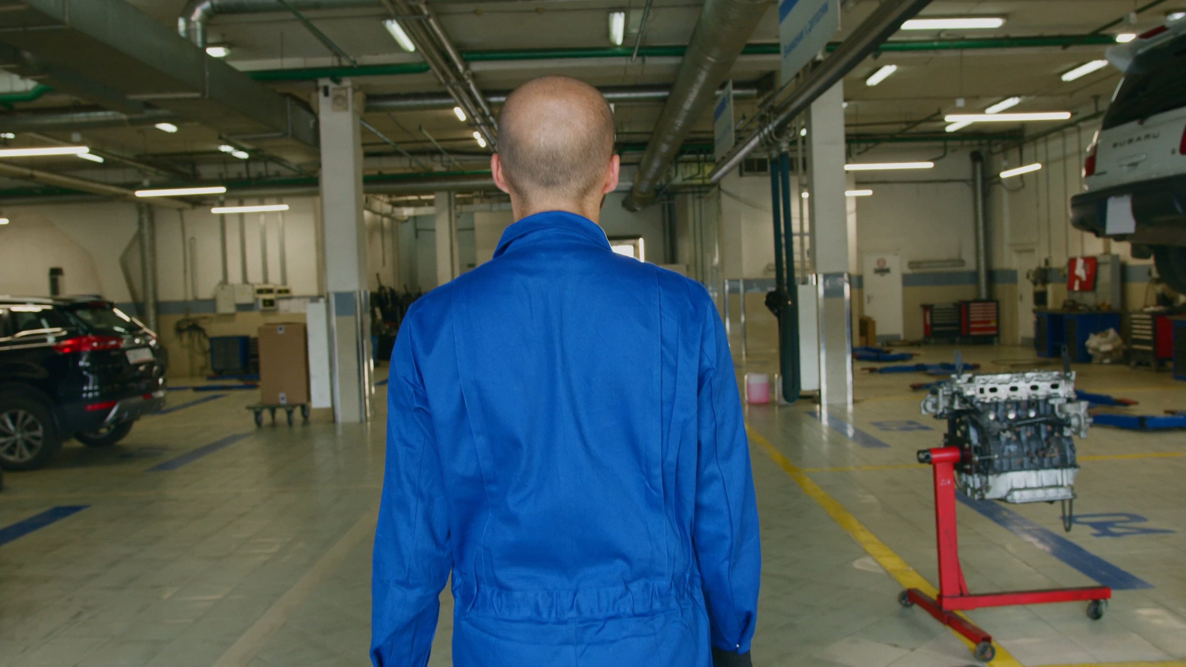 Mechanic Walking In a Garage Free Stock Video Footage, Royalty-Free 4K ...