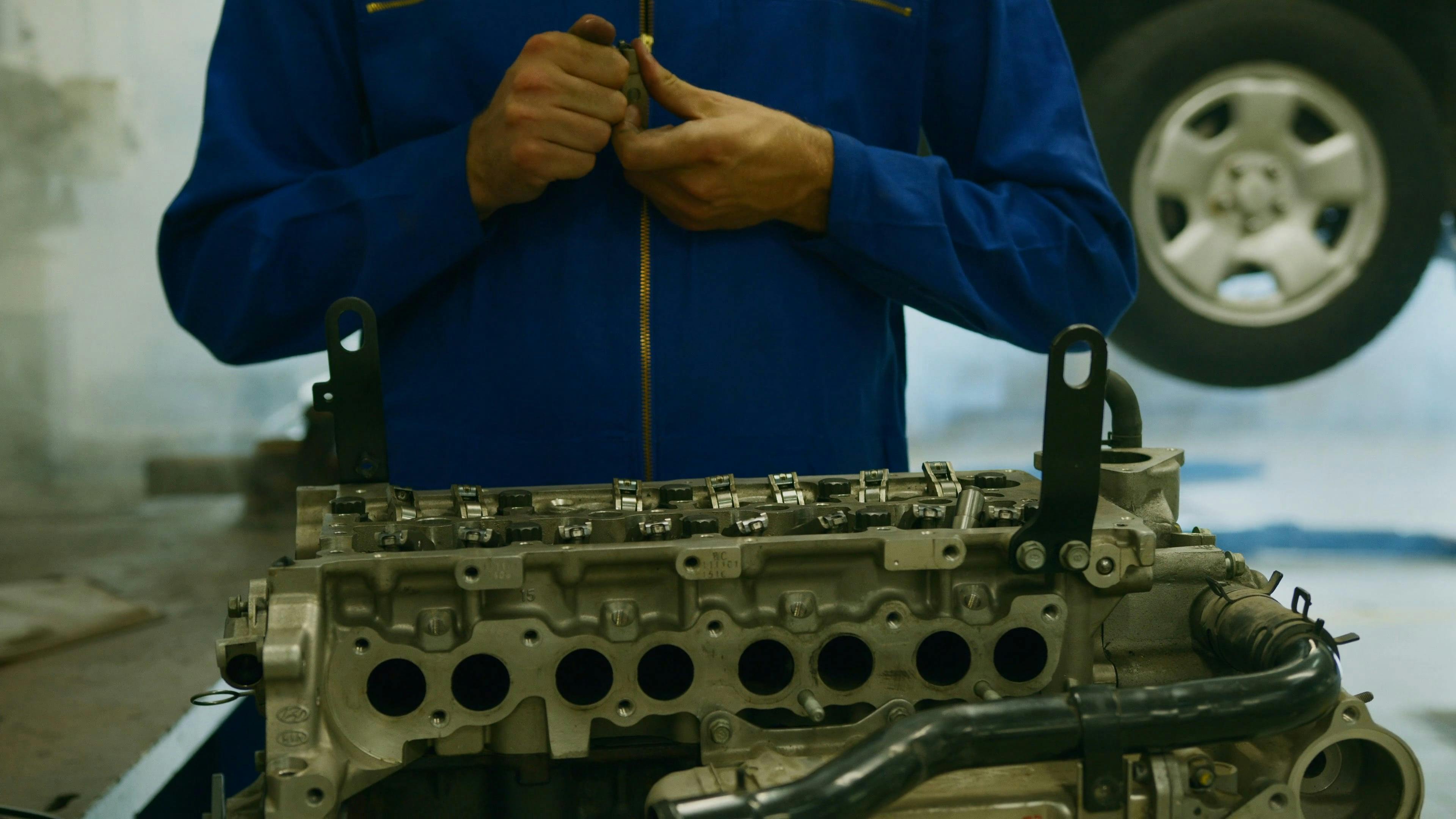 An Auto Mechanic Repairing a Car Engine Free Stock Video Footage ...