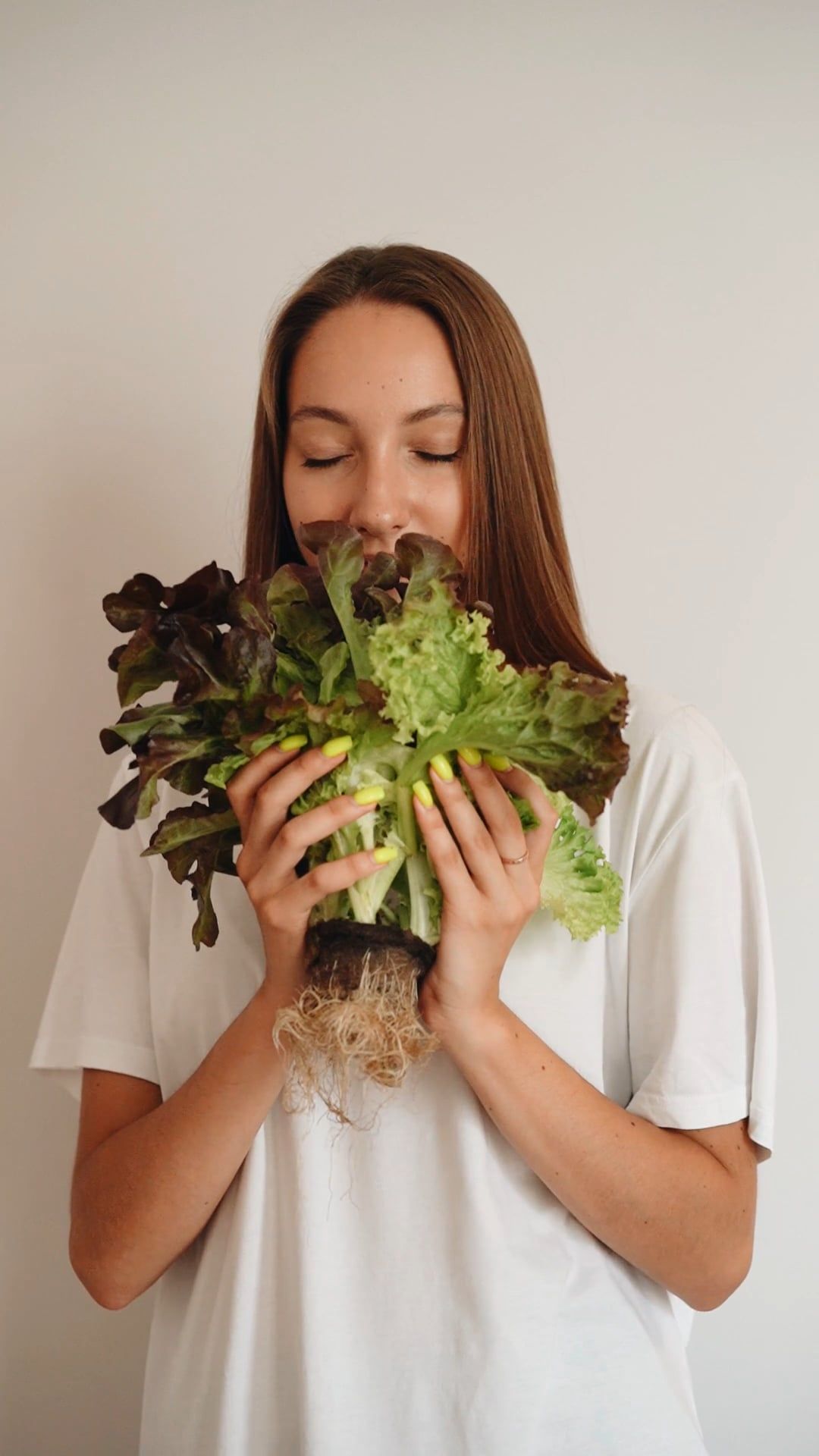 Woman Smelling Fresh Vegetables · Free Stock Video