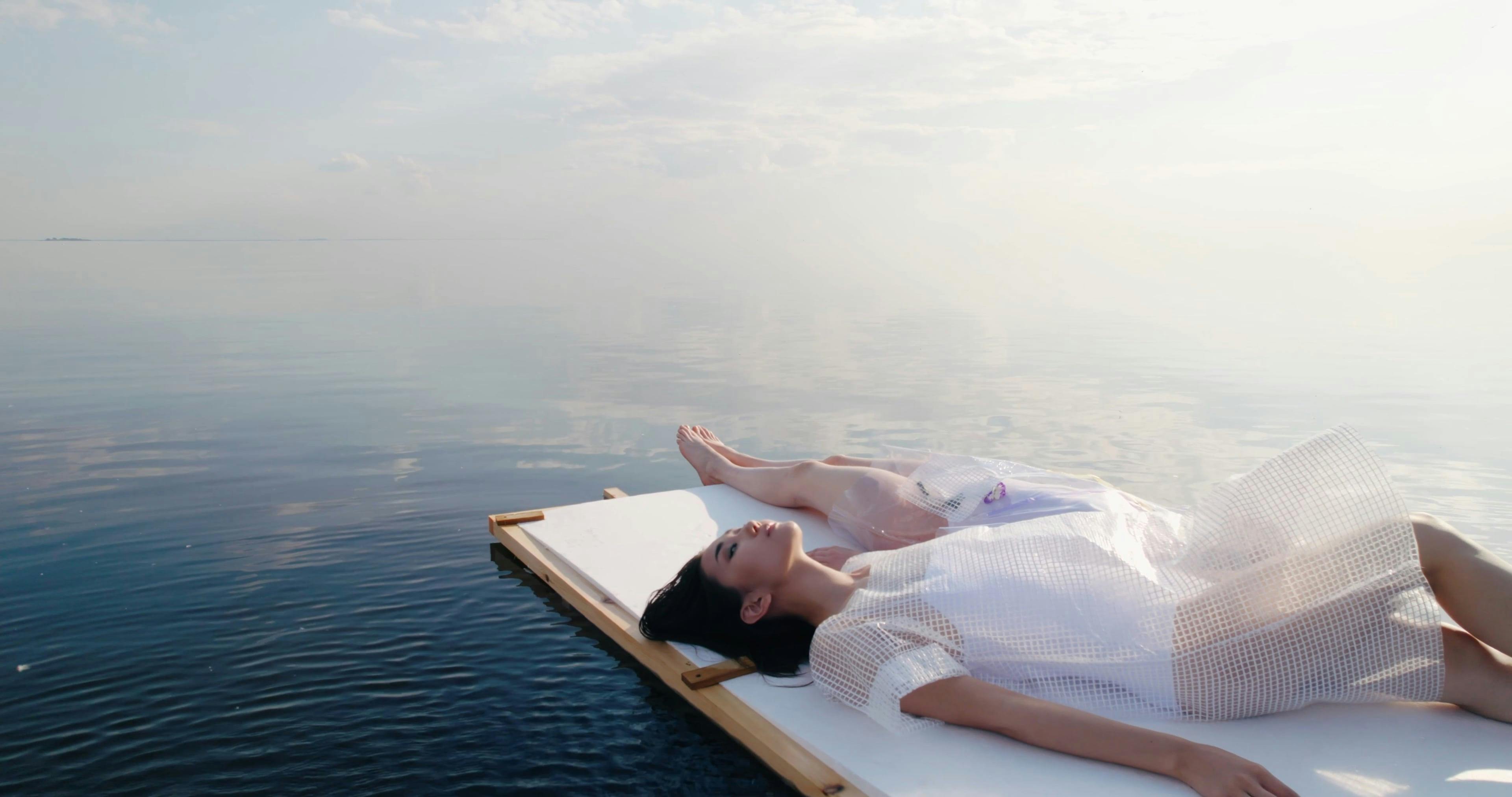 Women Lying Down On a Floating Raft Free Stock Video Footage, Royalty ...