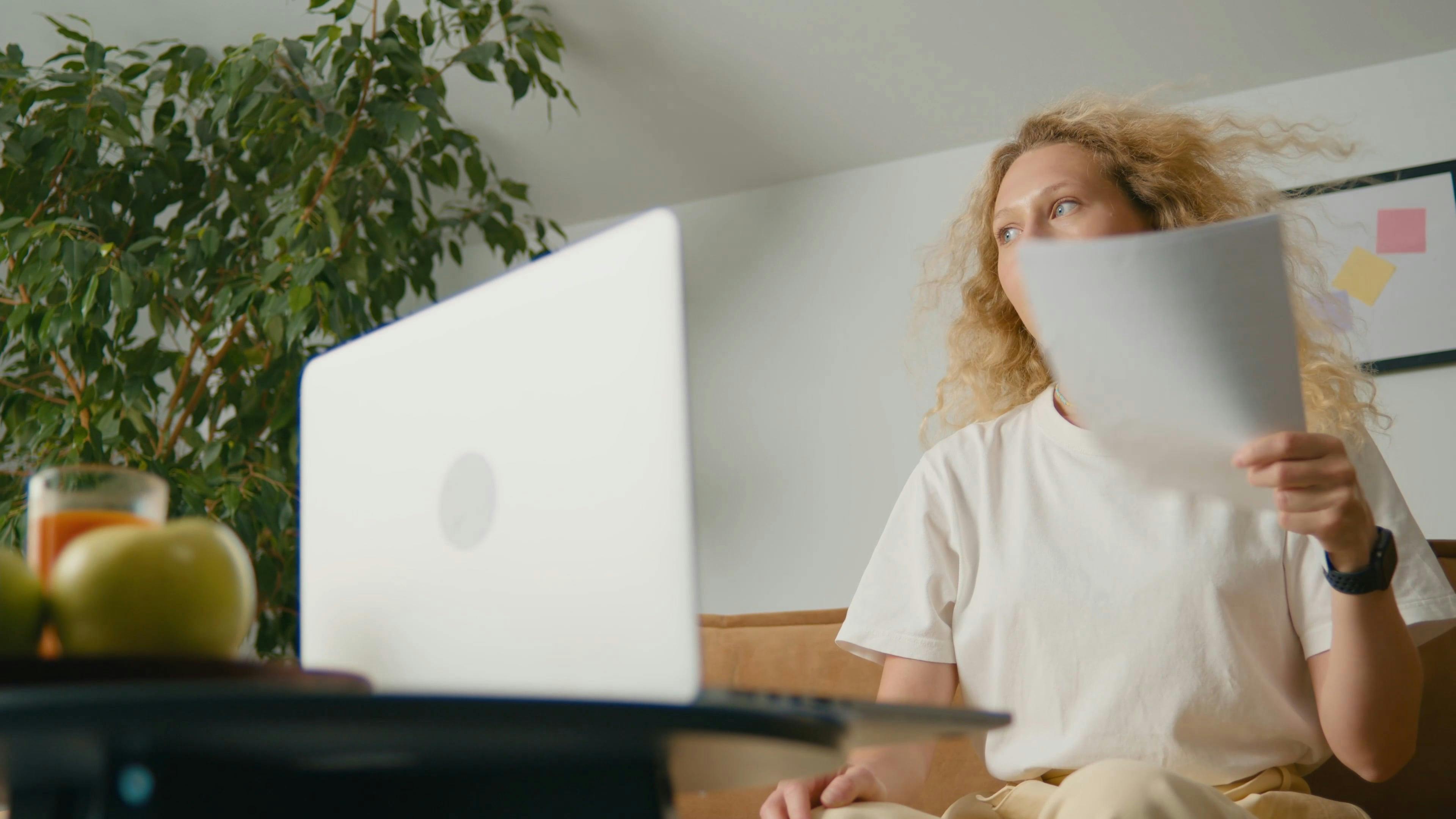 A Woman Fanning Using a Bond Paper Free Stock Video Footage, Royalty ...