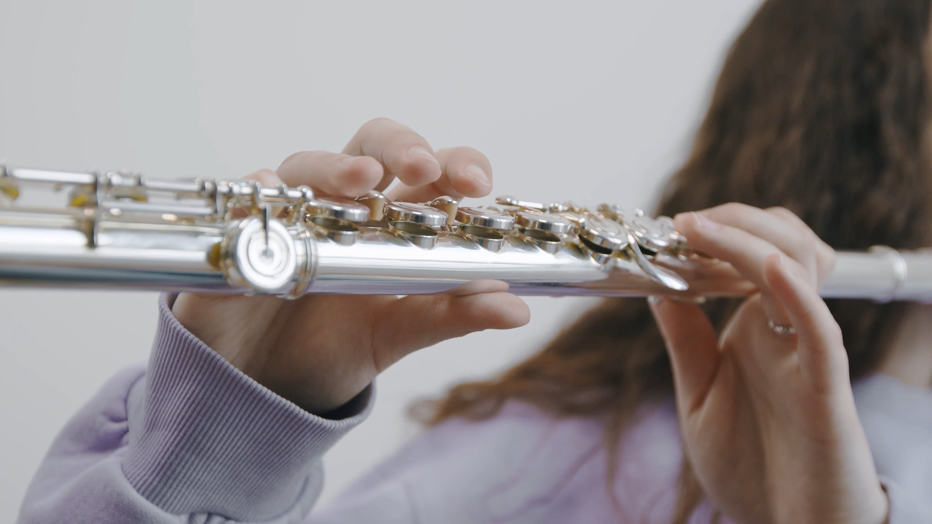 A Woman Playing the Flute Free Stock Video Footage, Royalty-Free 4K ...