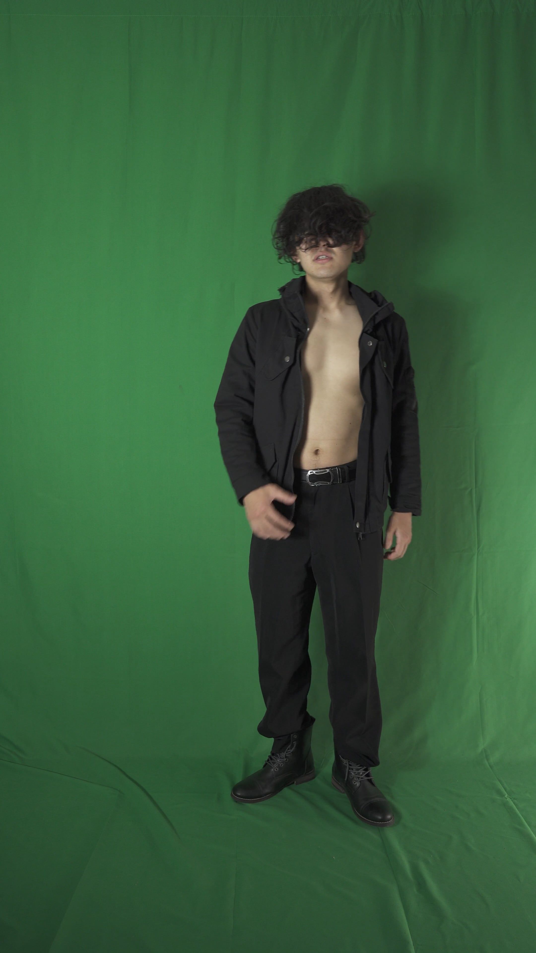 Male Model On a Green Background · Free Stock Video