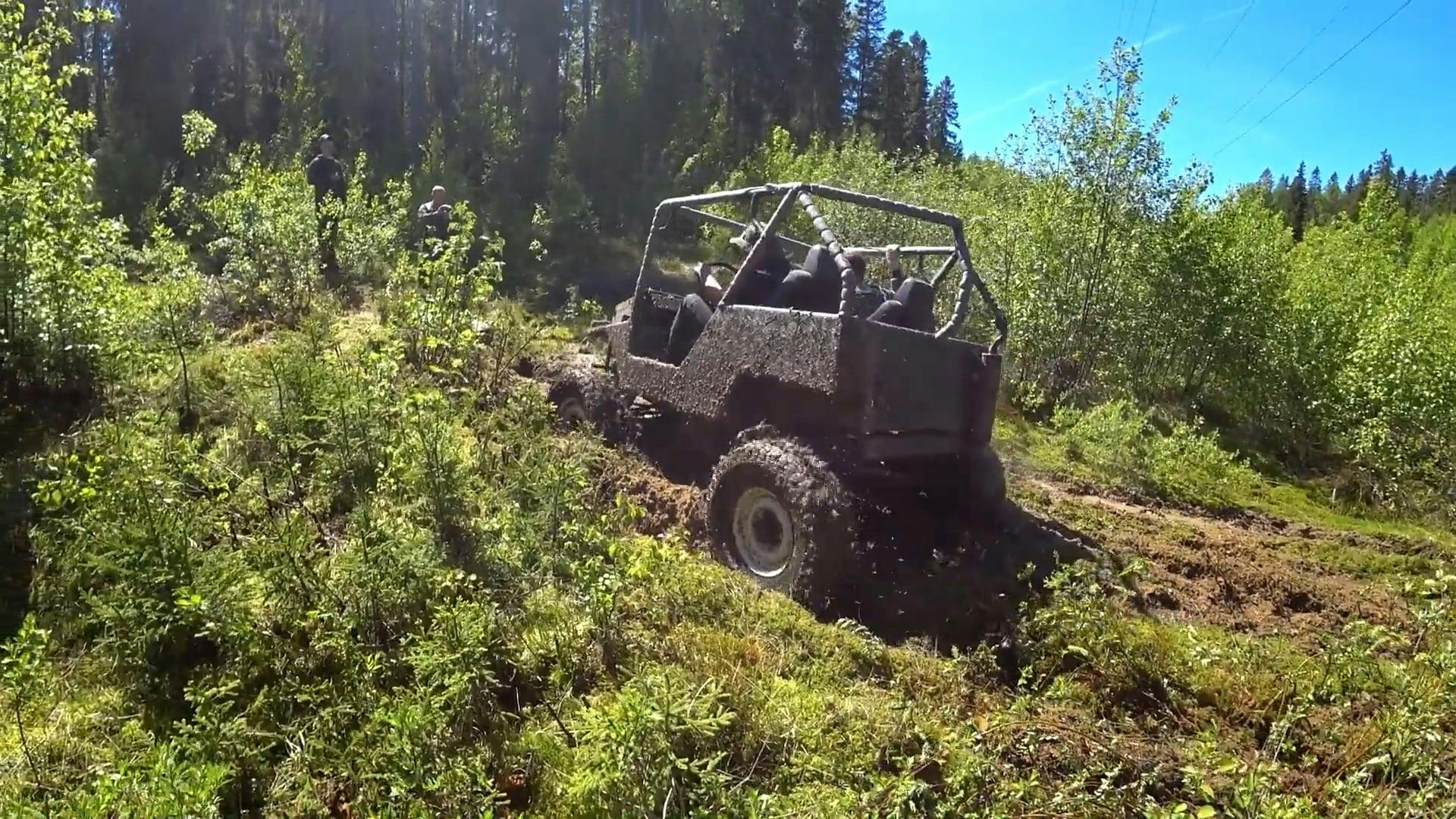 A Car Traveling On An Off Road Of A Forest Painting Free Stock Video ...