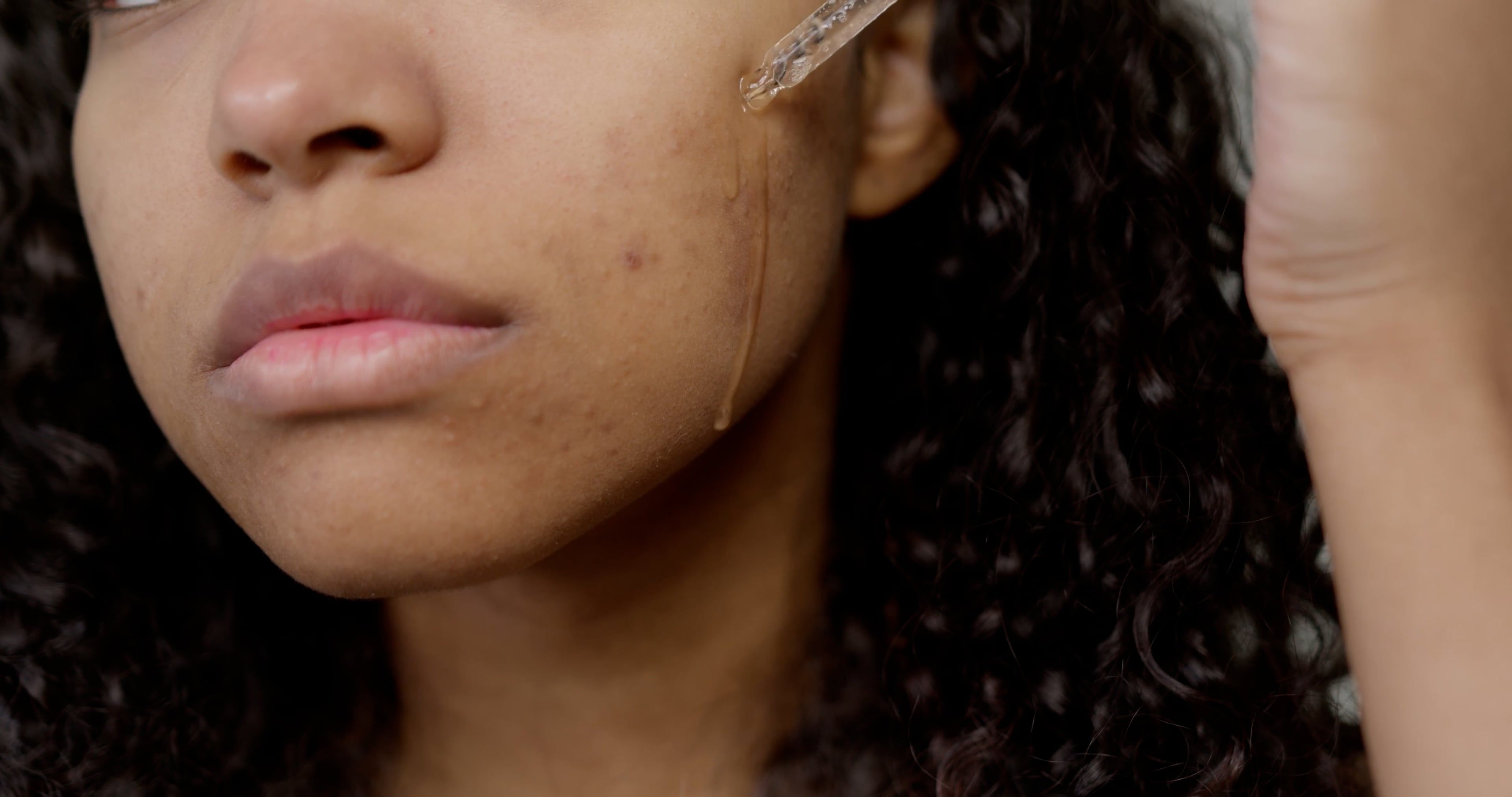 Close Up of a Woman Applying Serum on her Face Free Stock Video Footage ...