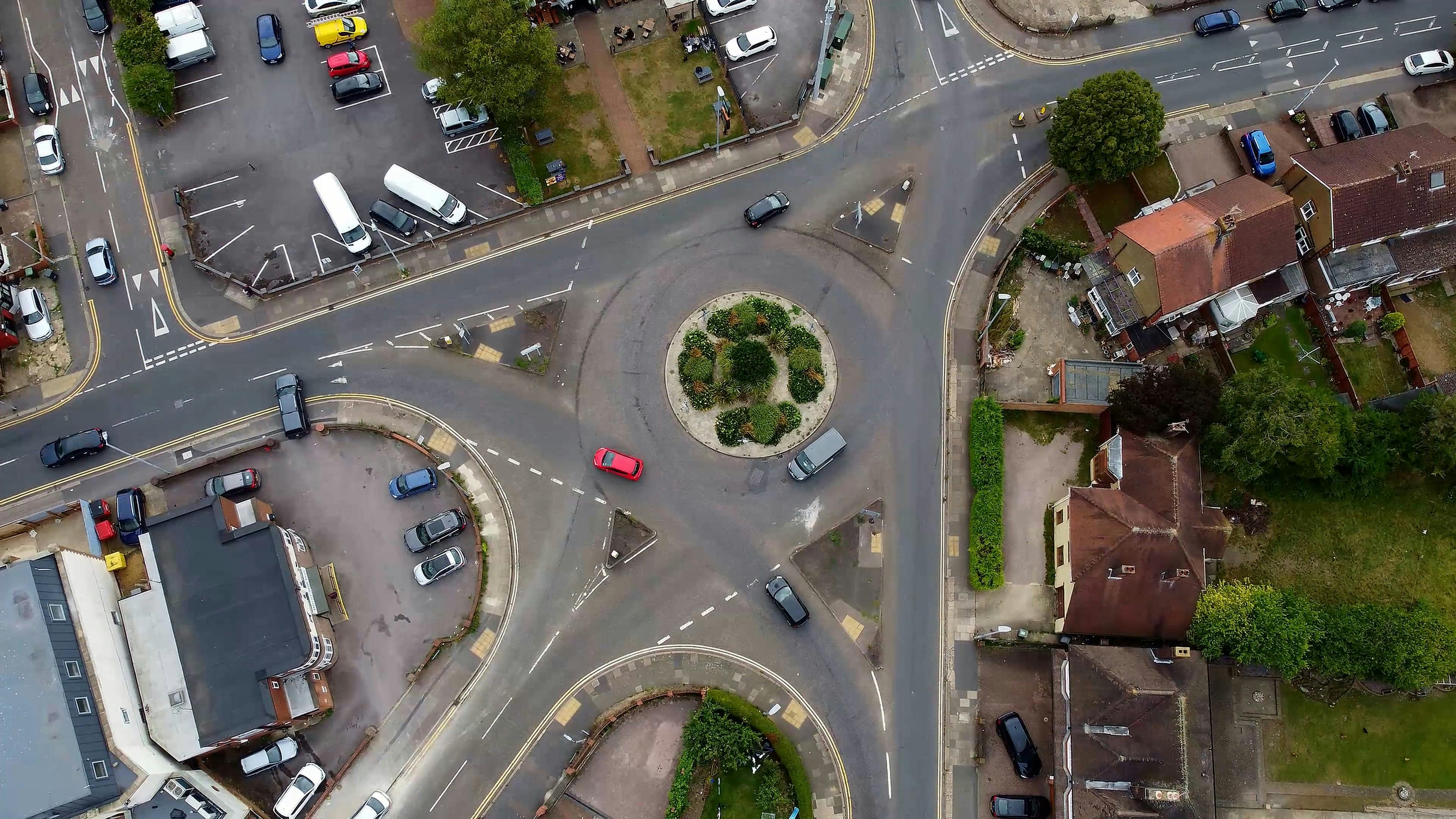 An aerial view of a roundabout with cars Free Stock Video Footage ...