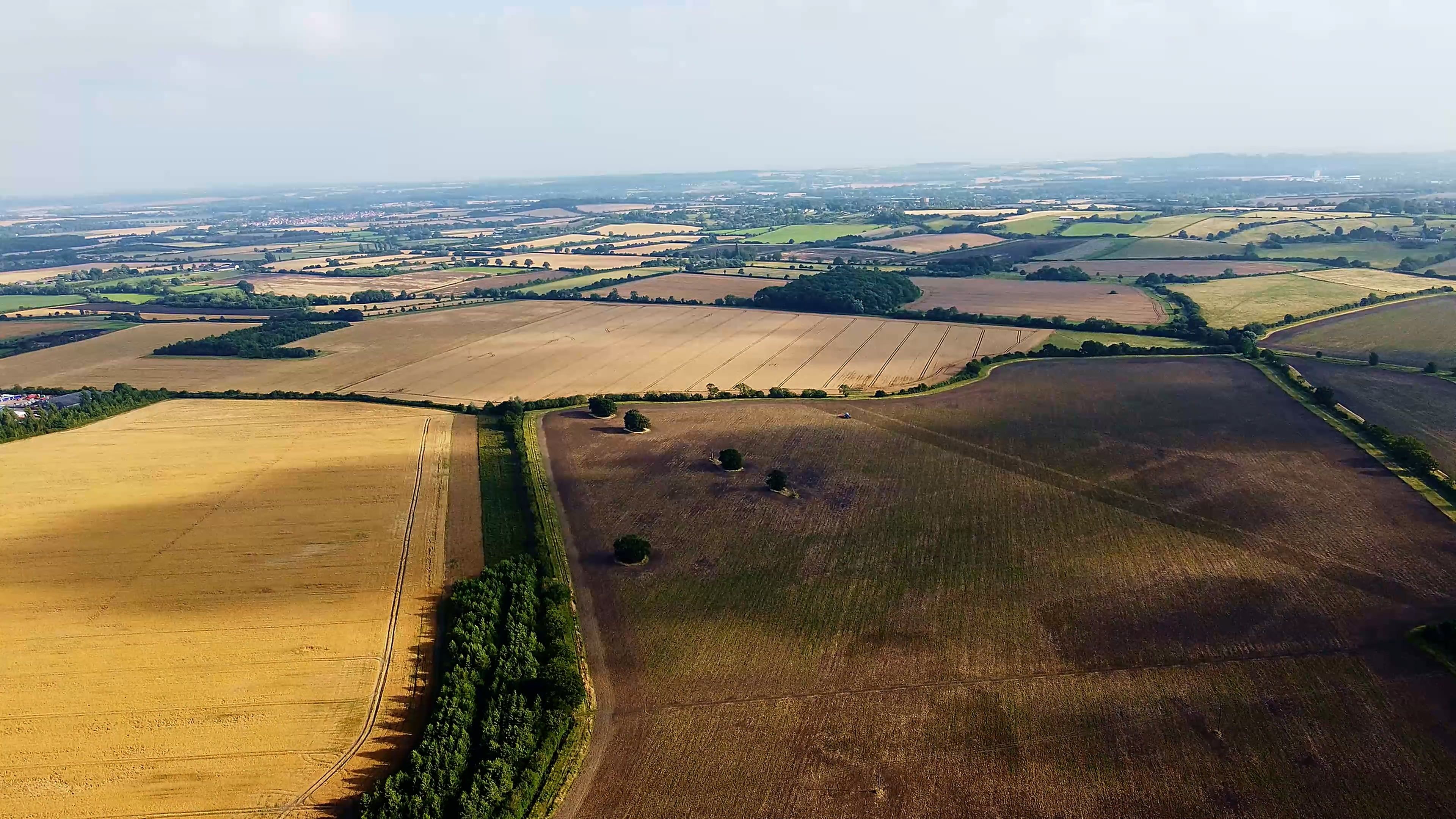 An aerial view of a field with a large field Free Stock Video Footage ...