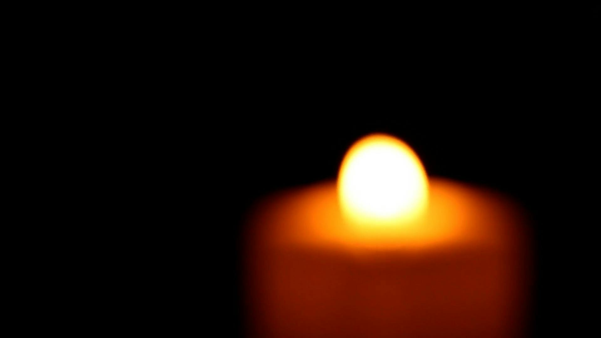 Person Lighting Up A Candle · Free Stock Video