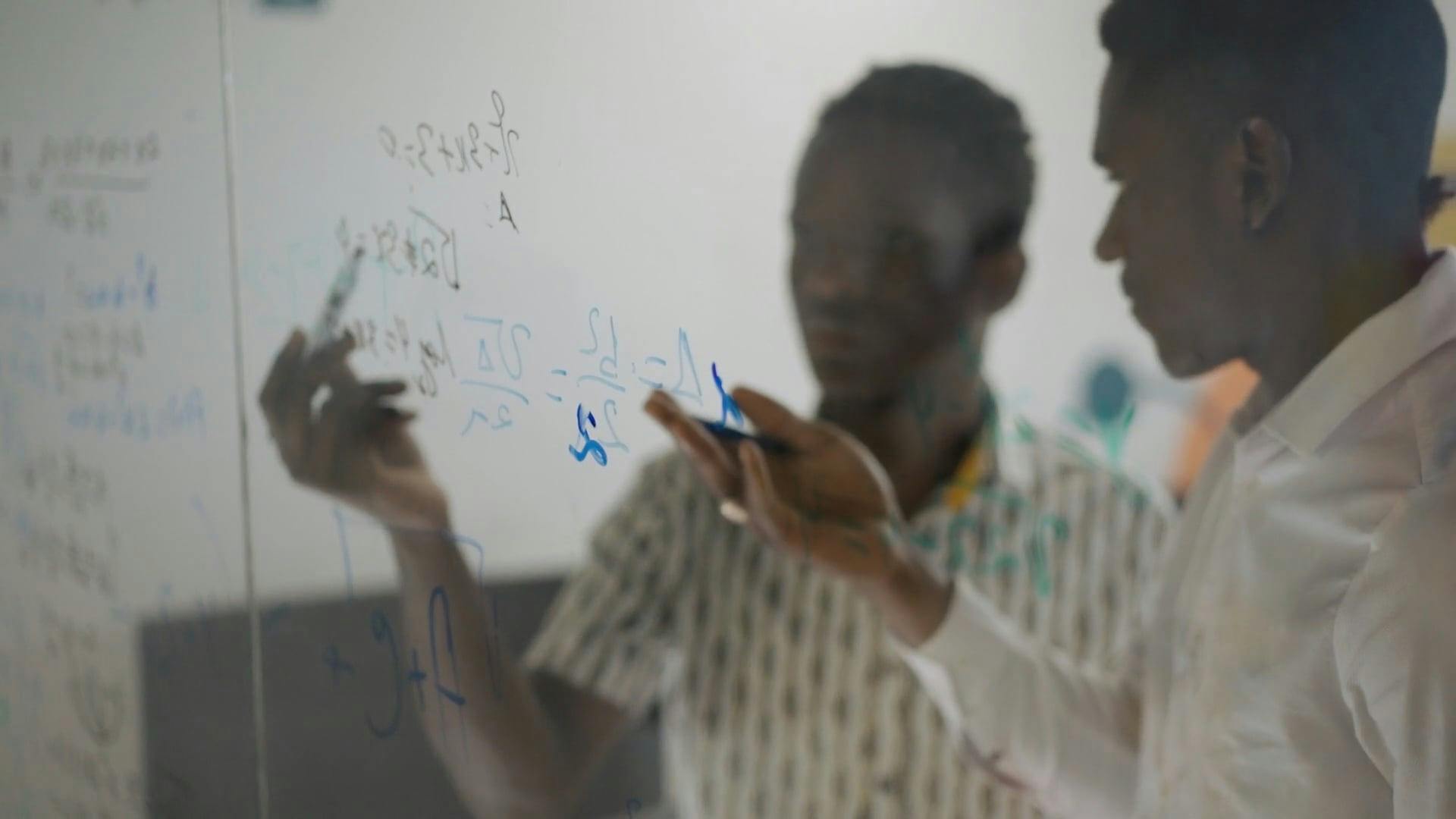 Footage of Men Solving Number Problems on a Board Free Stock Video ...