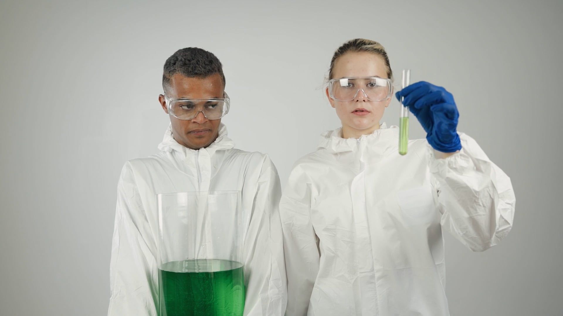 Man and Woman doing Experiment at the Laboratory Free Stock Video ...