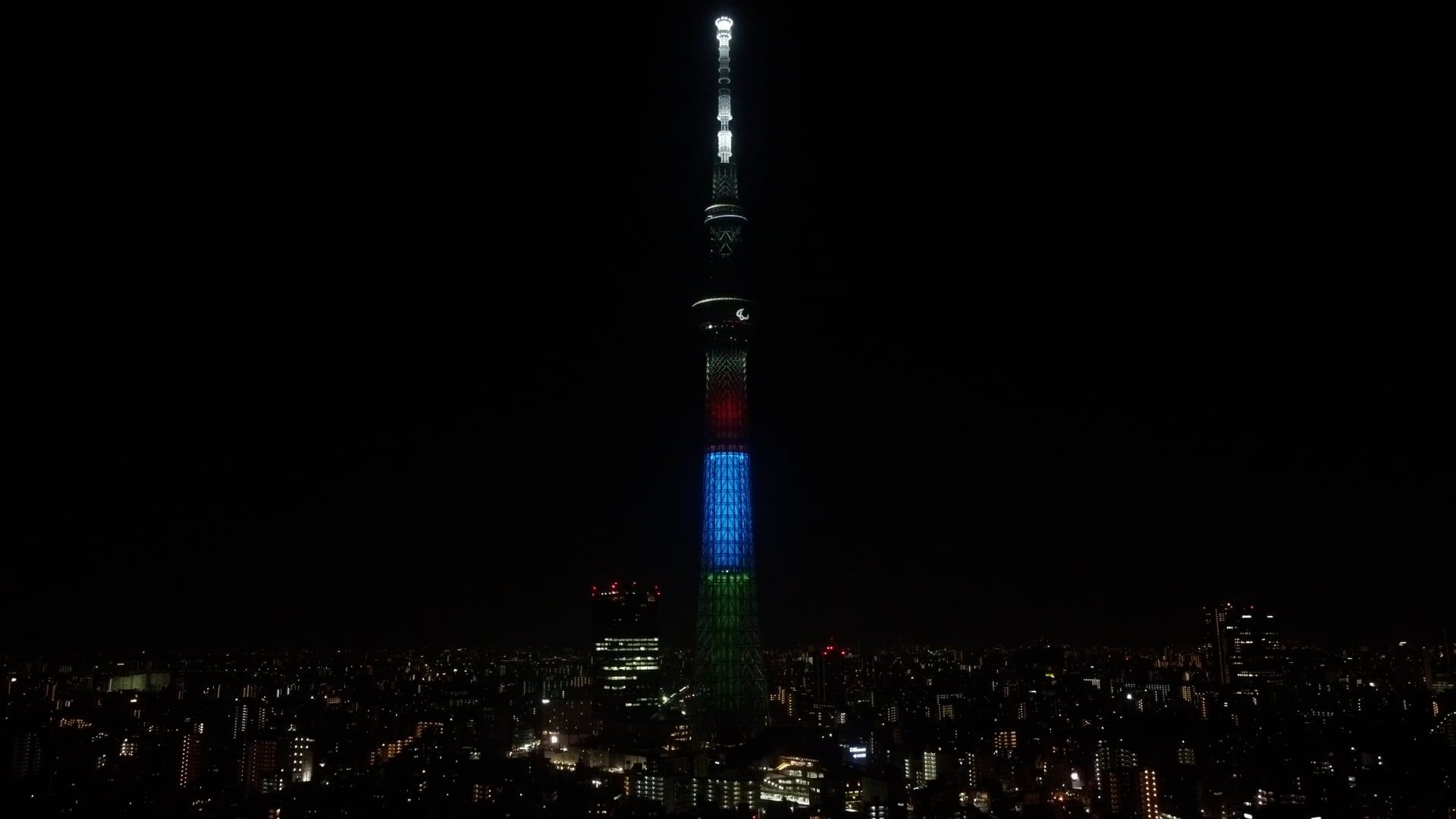 The tokyo tower lit up in blue and red Free Stock Video Footage ...