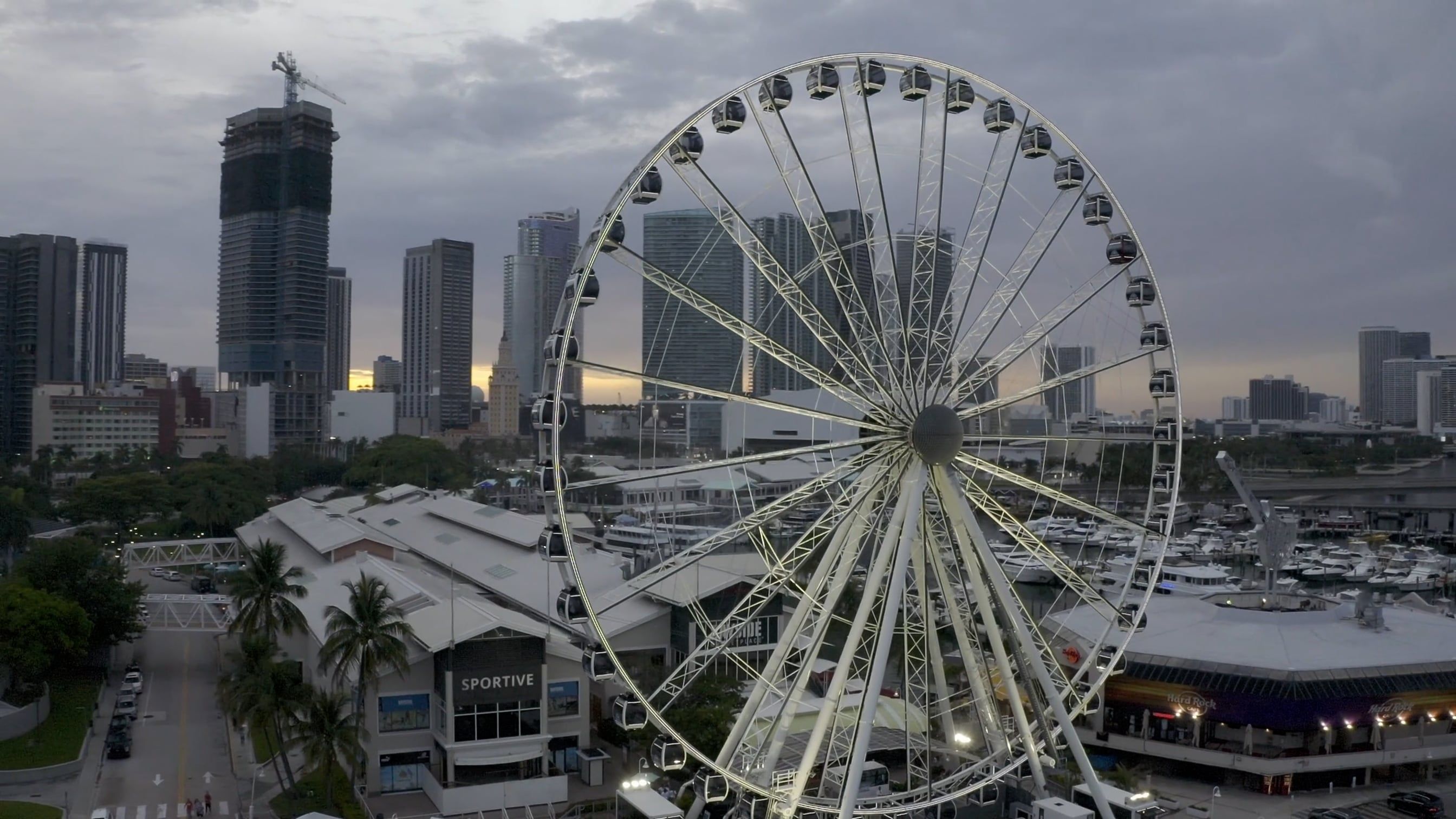 Aerial Footage of a Ferris Wheel in a Modern City Free Stock Video ...