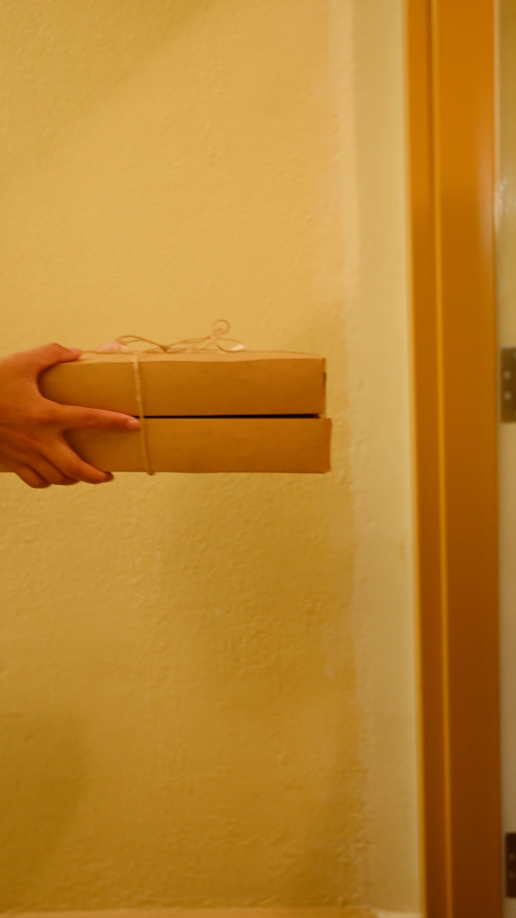 A person holding a box in their hand Free Stock Video Footage, Royalty ...