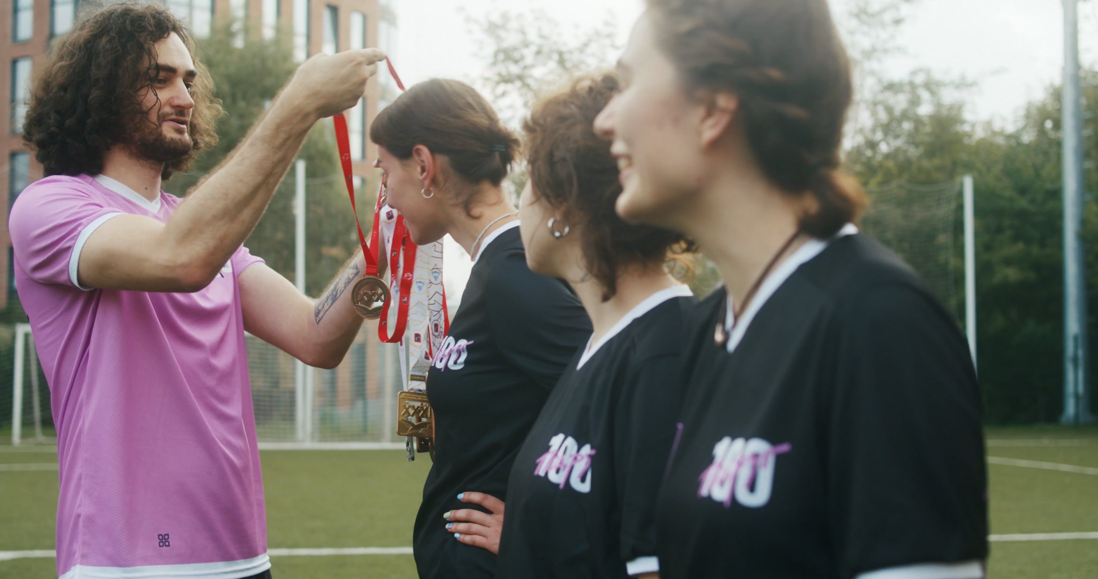 Coach Giving Medals to the Players · Free Stock Video