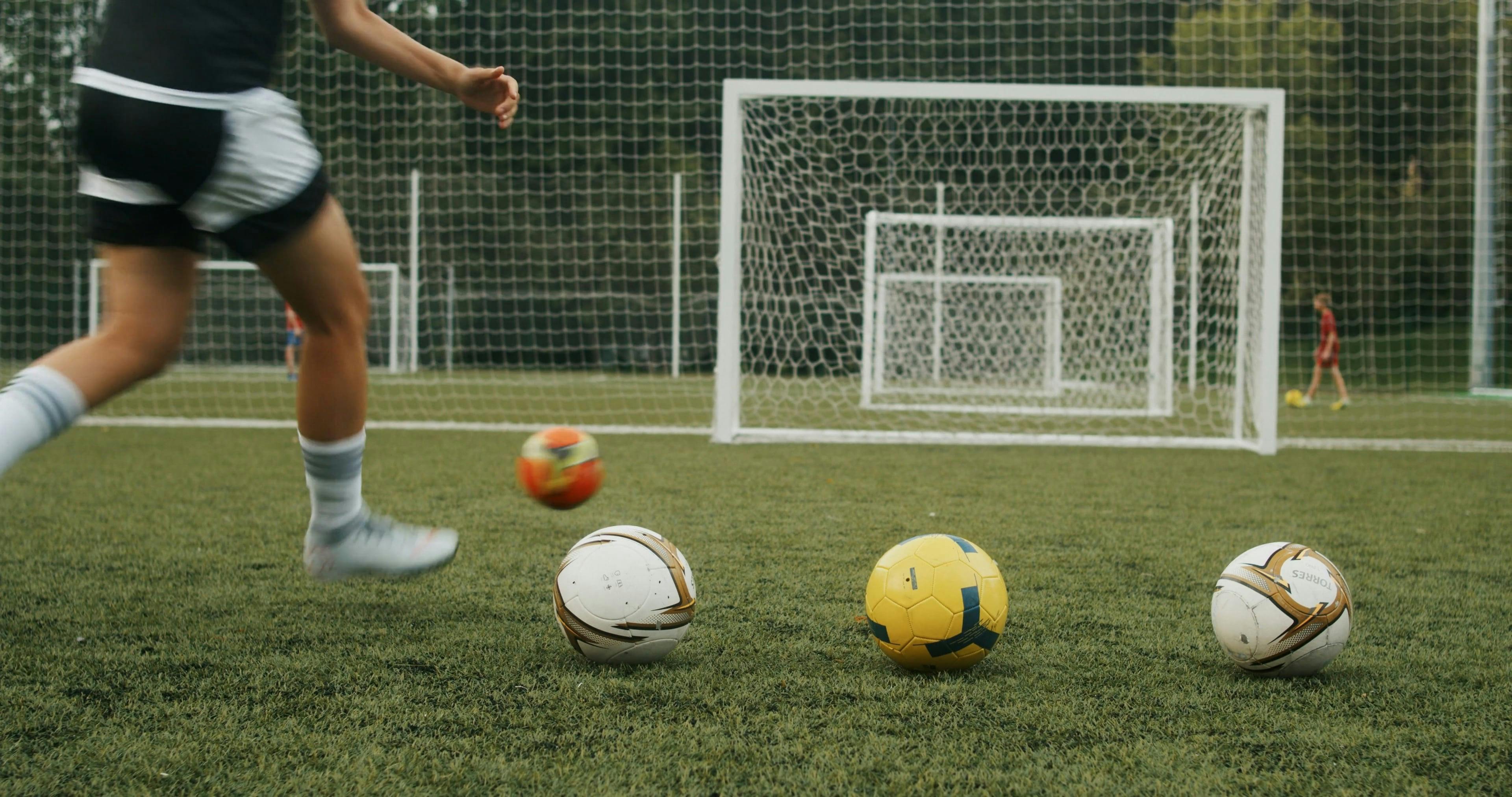 Two people playing soccer on a field Free Stock Video Footage, Royalty ...