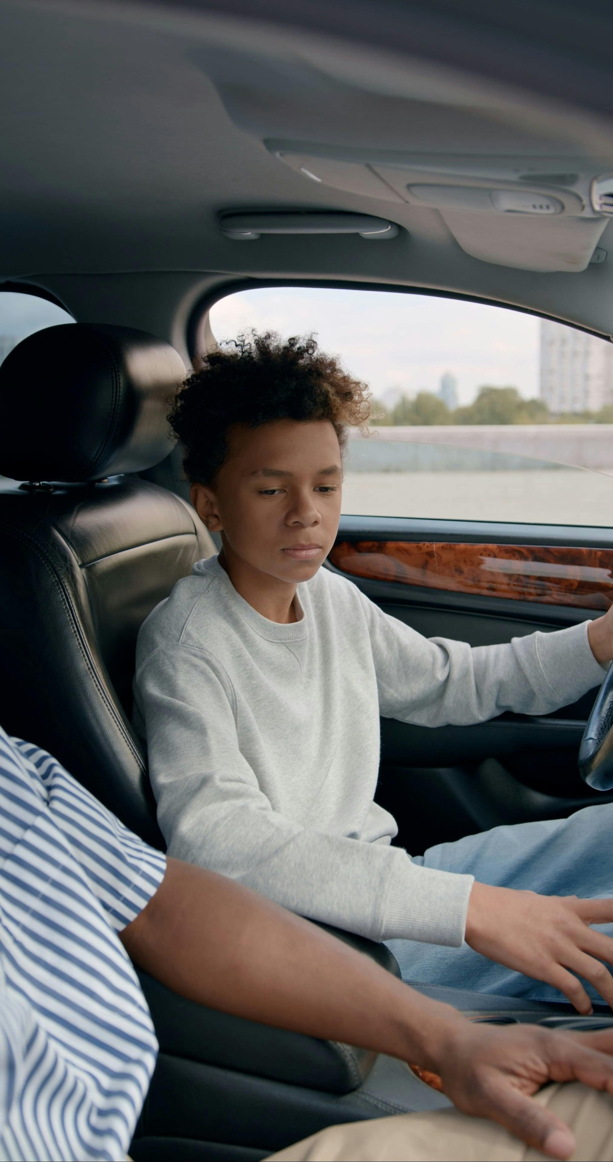 A Boy Pretending to Drive a Car Free Stock Video Footage, Royalty-Free ...