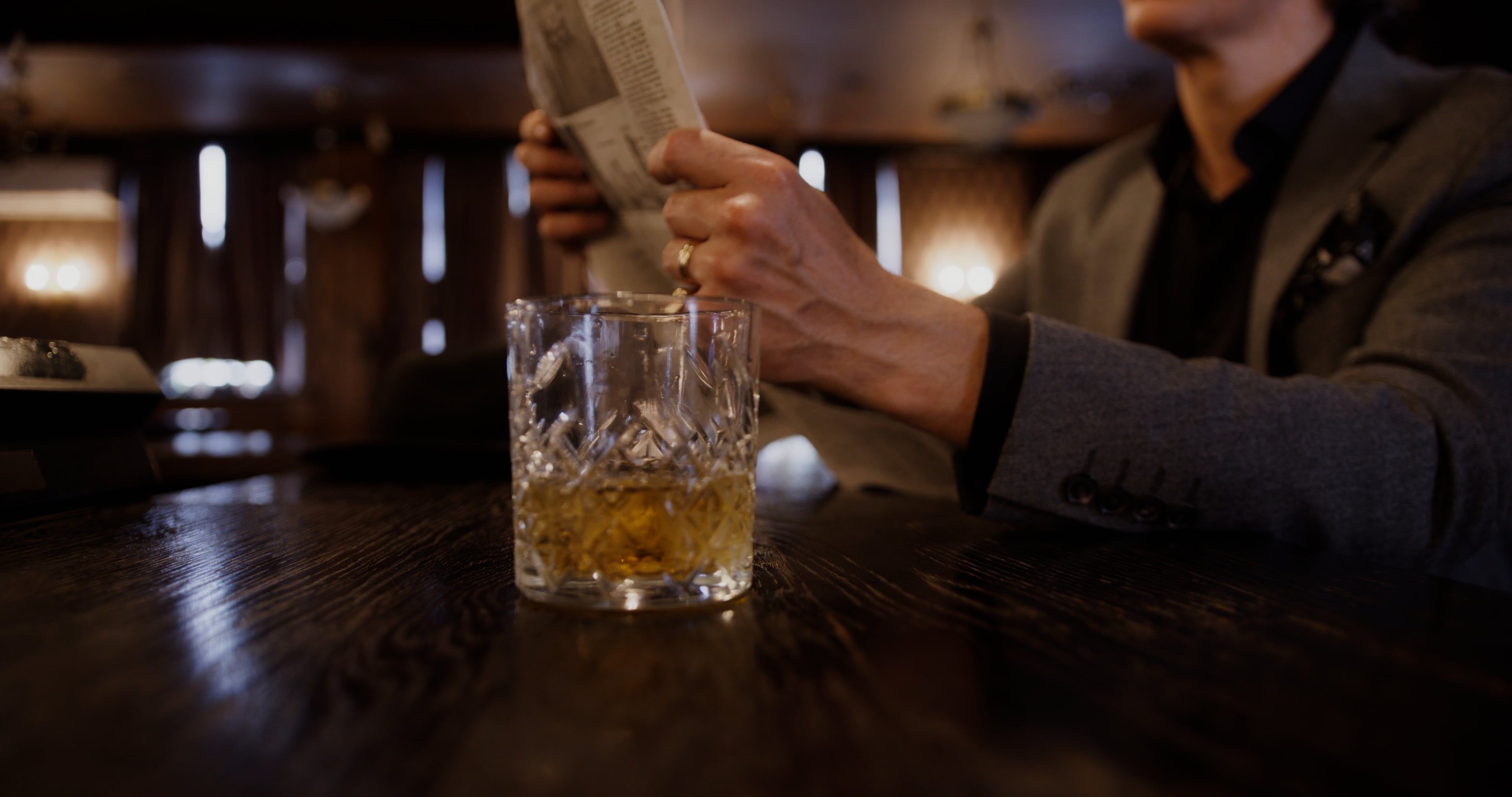 A Person Drinking while Reading Newspaper Free Stock Video Footage ...