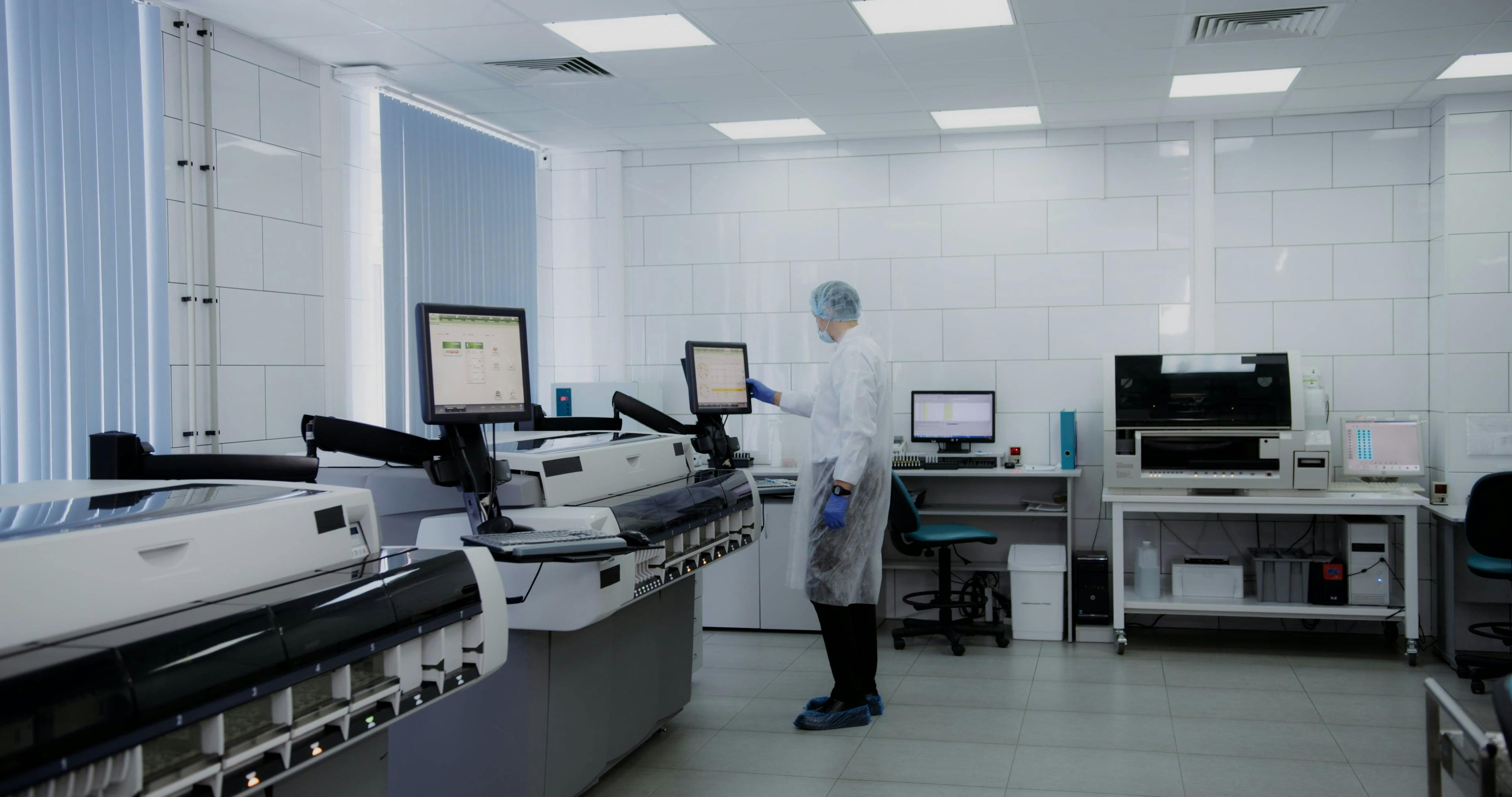 A Man and Woman Touching a Monitor's Screen at the Lab Free Stock Video ...