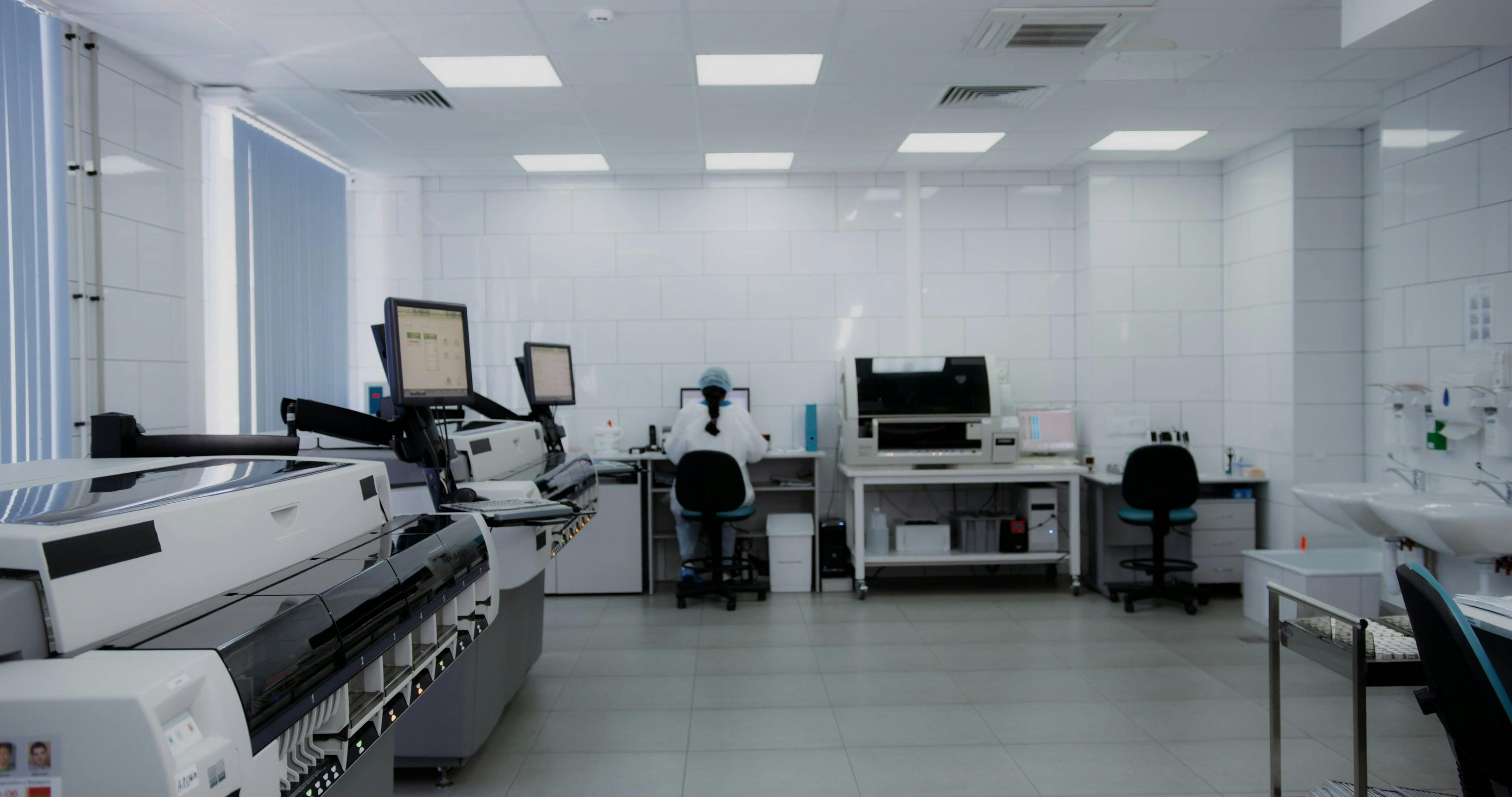 A Man Working in a Modern Laboratory · Free Stock Video