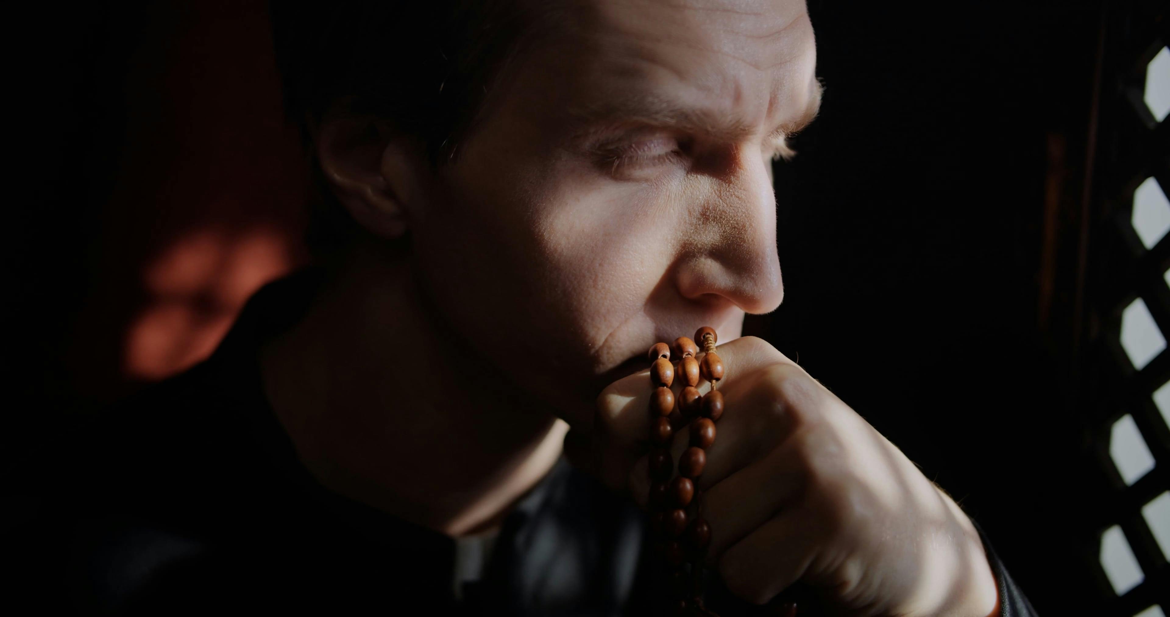 Priest Holding a Rosary During Confession Free Stock Video Footage ...