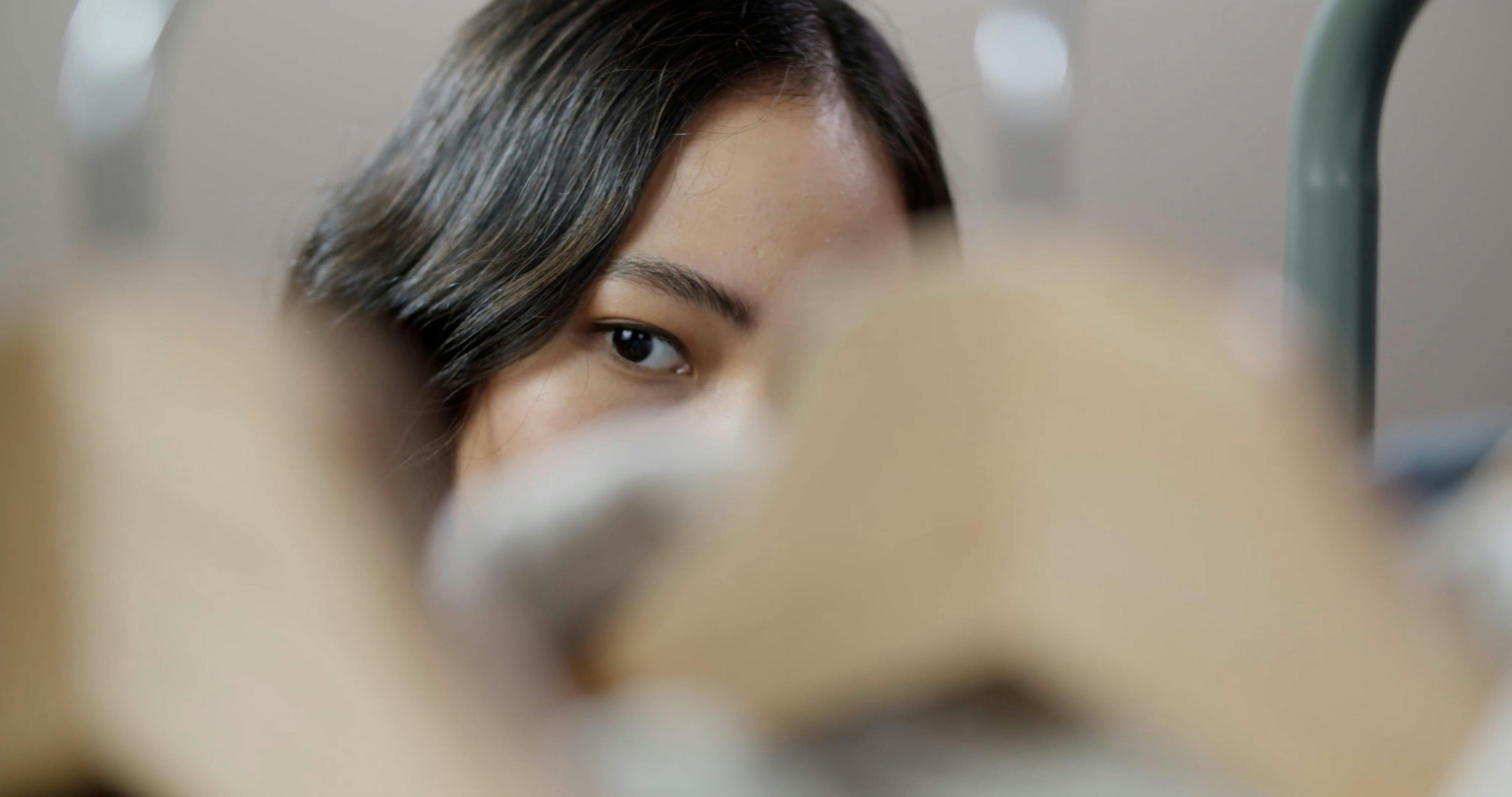 A Woman Parting The Clothes In The Clothes Line · Free Stock Video