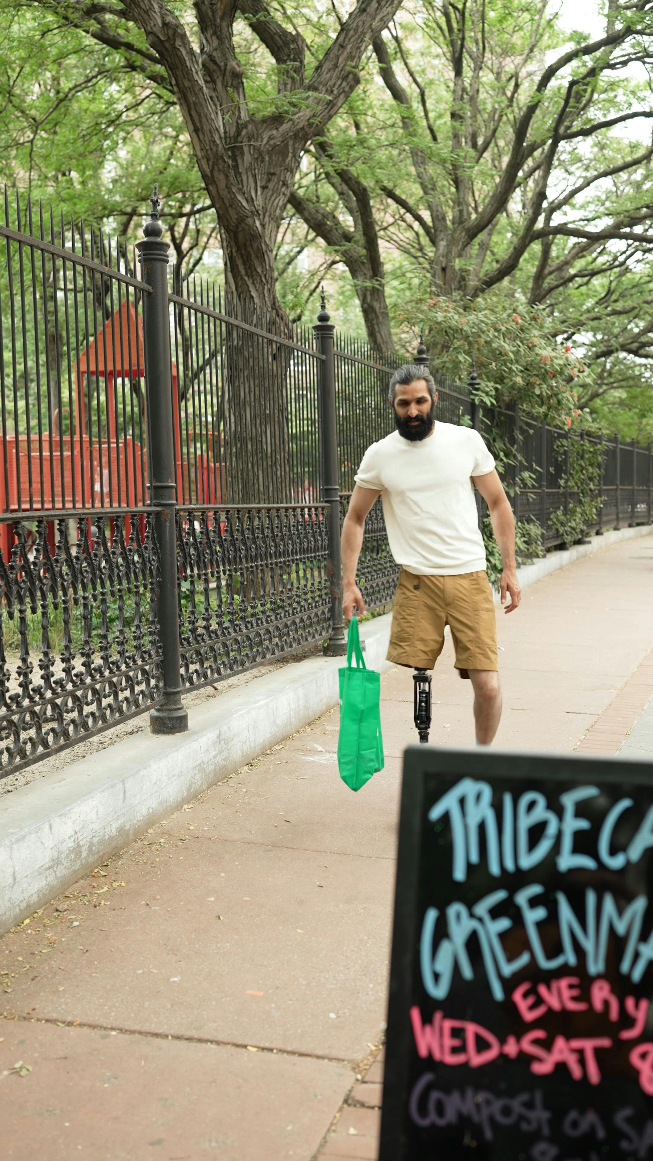 Man with Prosthetic Leg carrying Shopping Bag Free Stock Video Footage ...