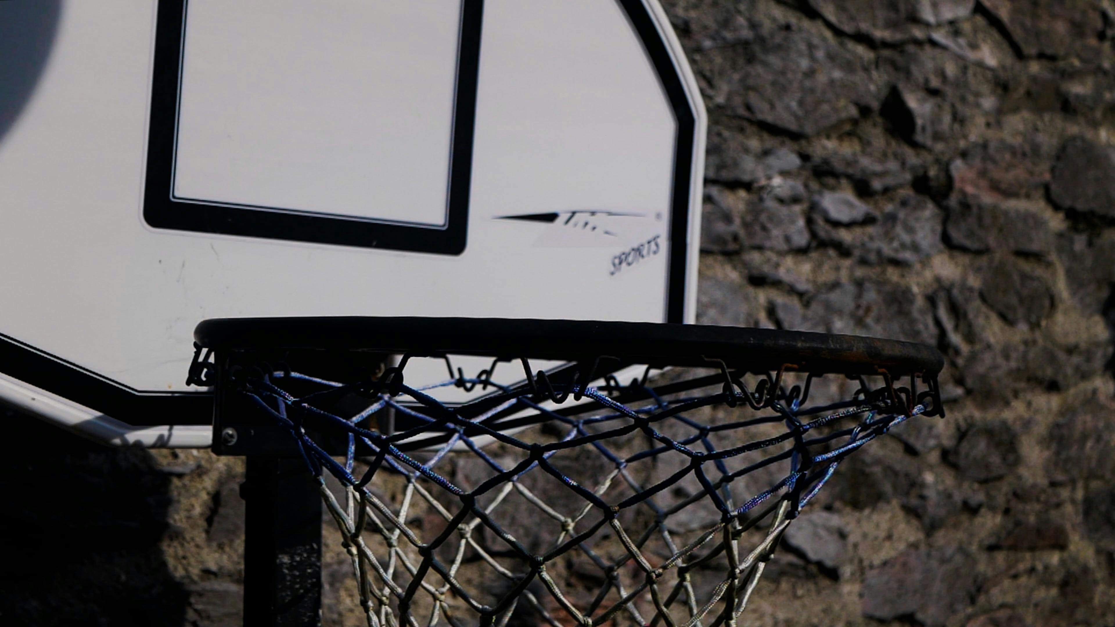 Close-Up Video of a Basketball Passing Through the Hoop Free Stock ...