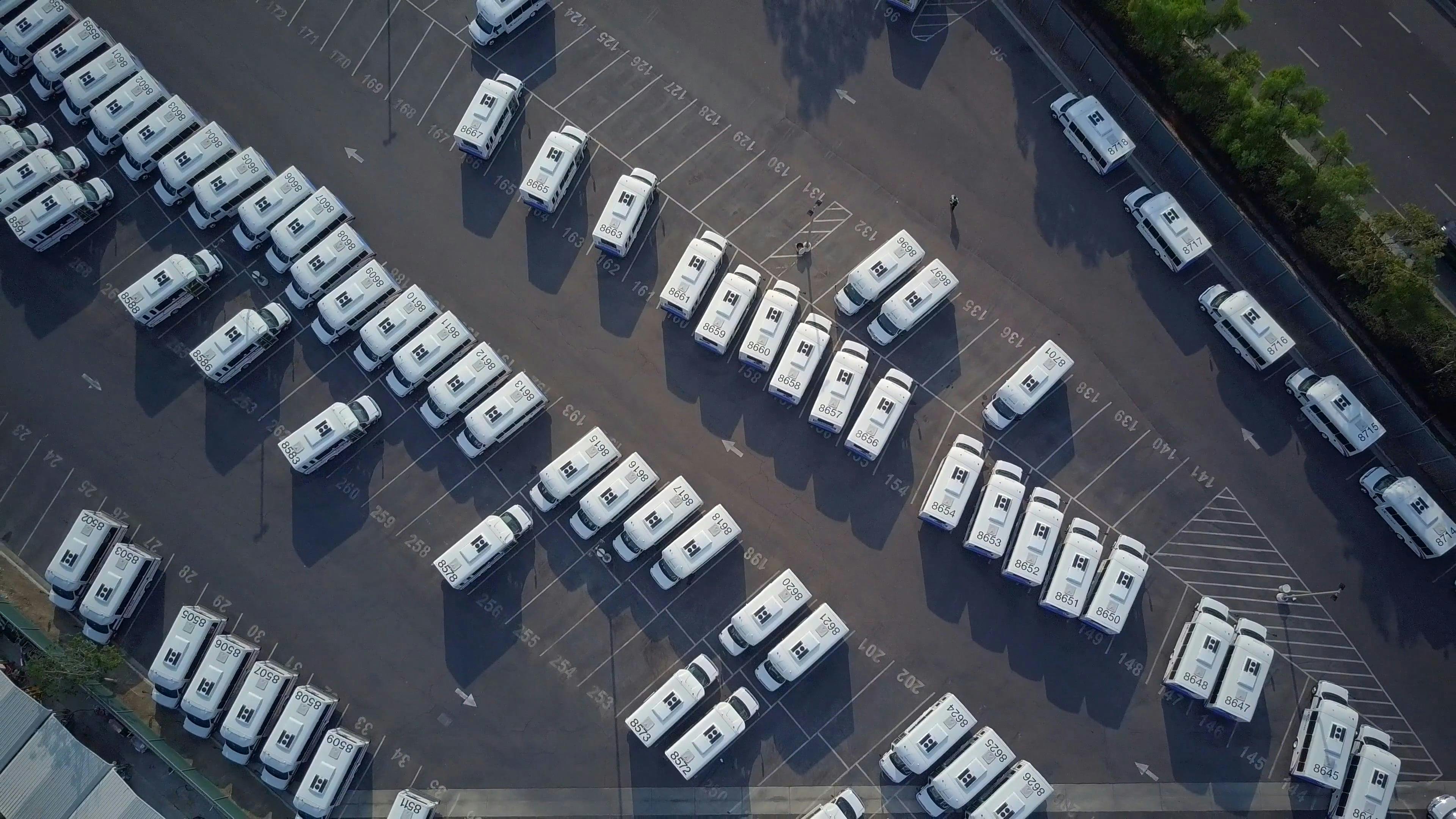 Aerial Footage of Parked Vans on an Open Lot Free Stock Video Footage ...