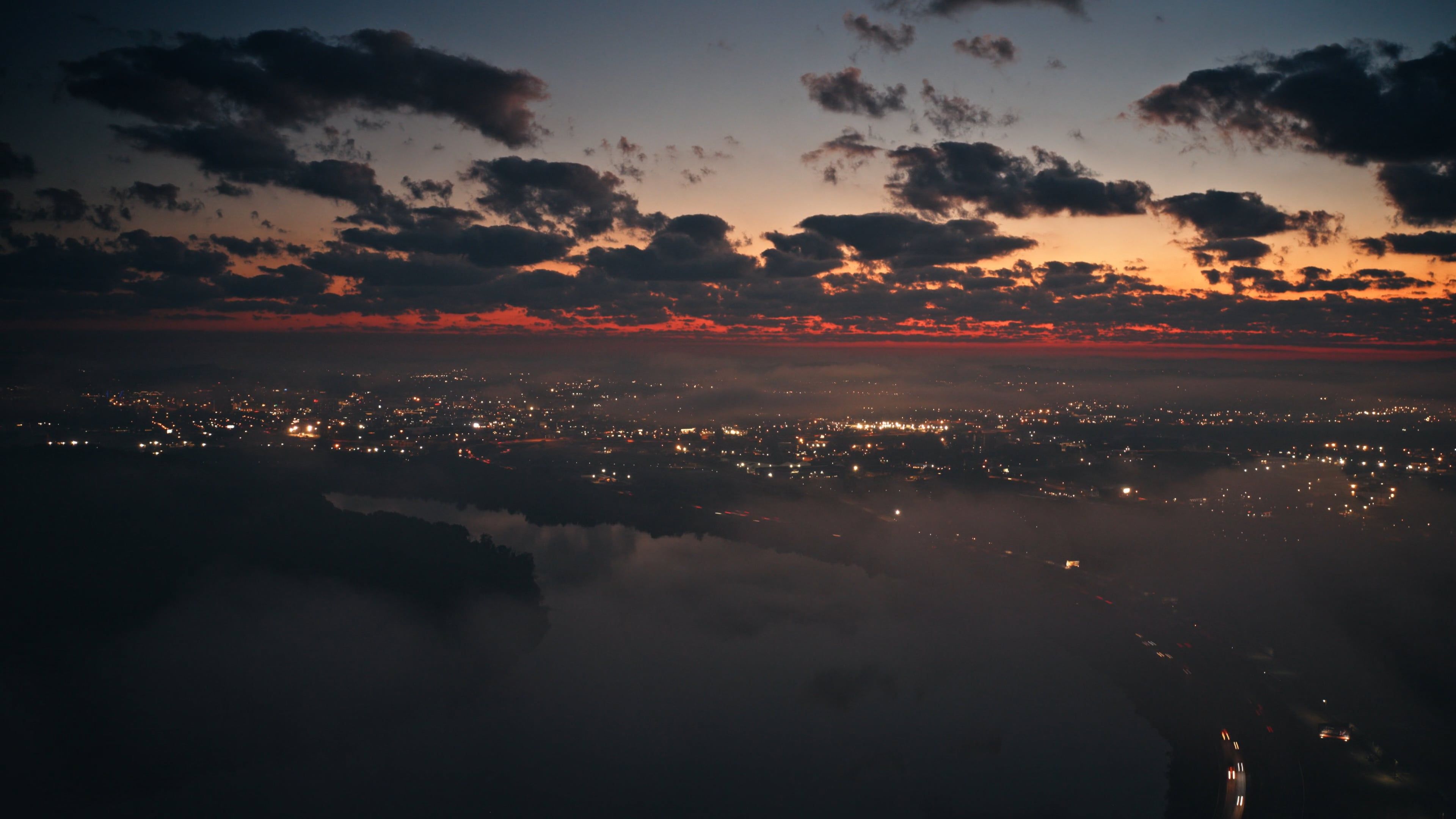 Aerial view on city during dawn · Free Stock Video