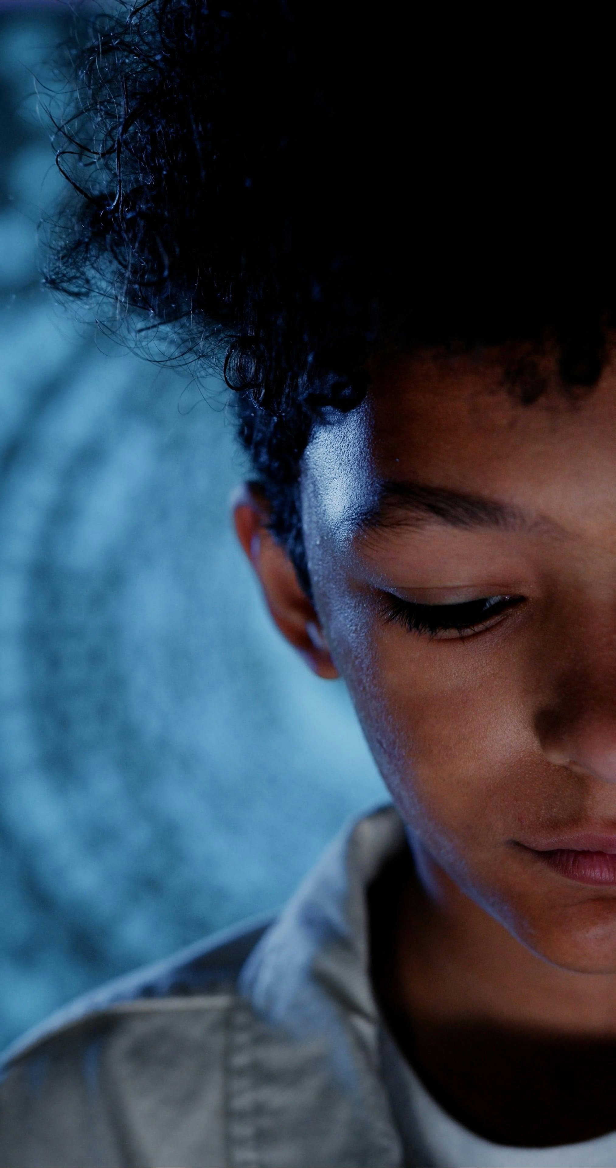Half Face Close up of a Boy with a Digital Background Free Stock Video ...